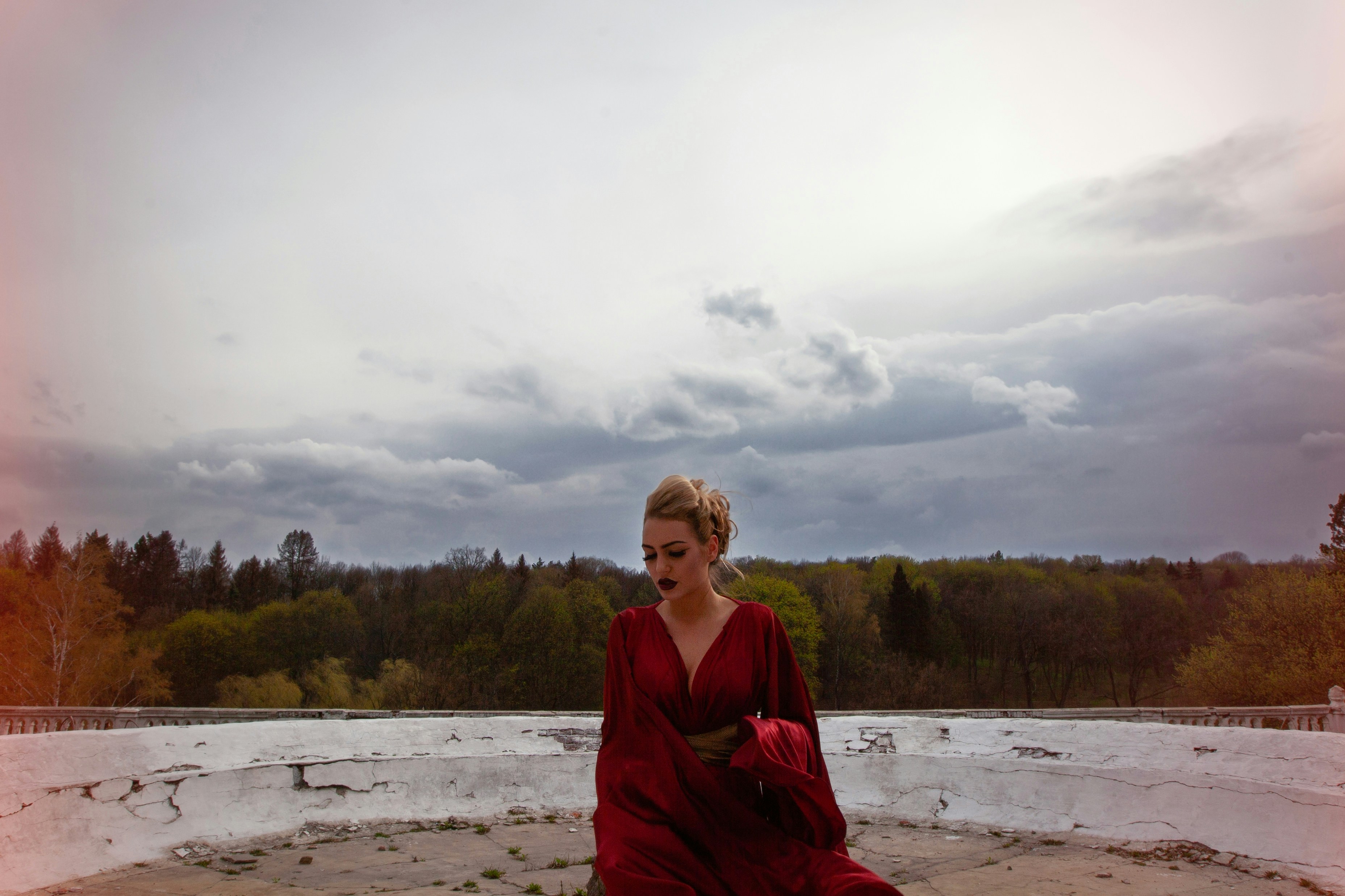 Red-robed Solitude on a Weathered Terrace