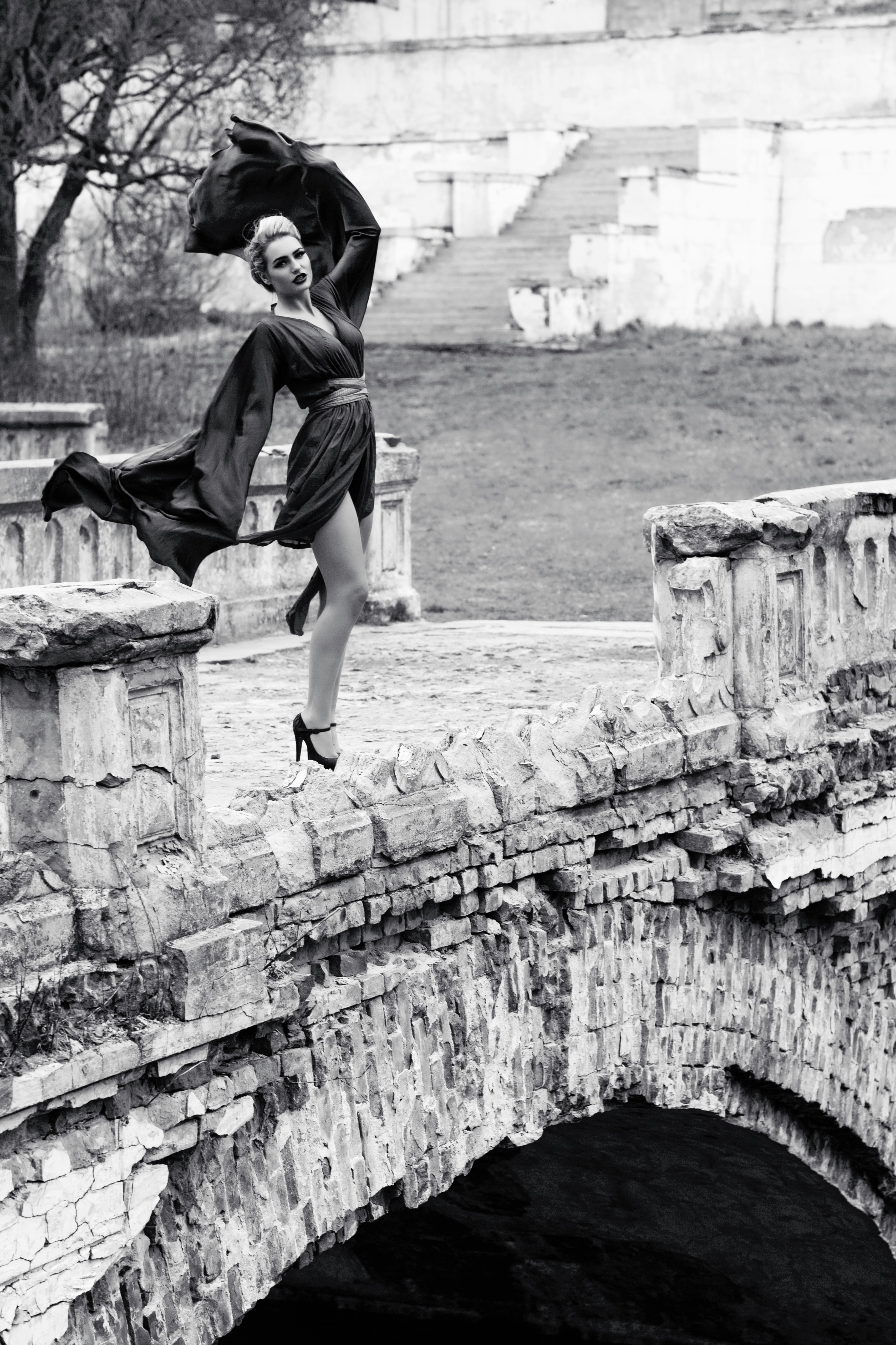 High Wire Grace Across Stone: A Black-and-White Ballet on the Ruins