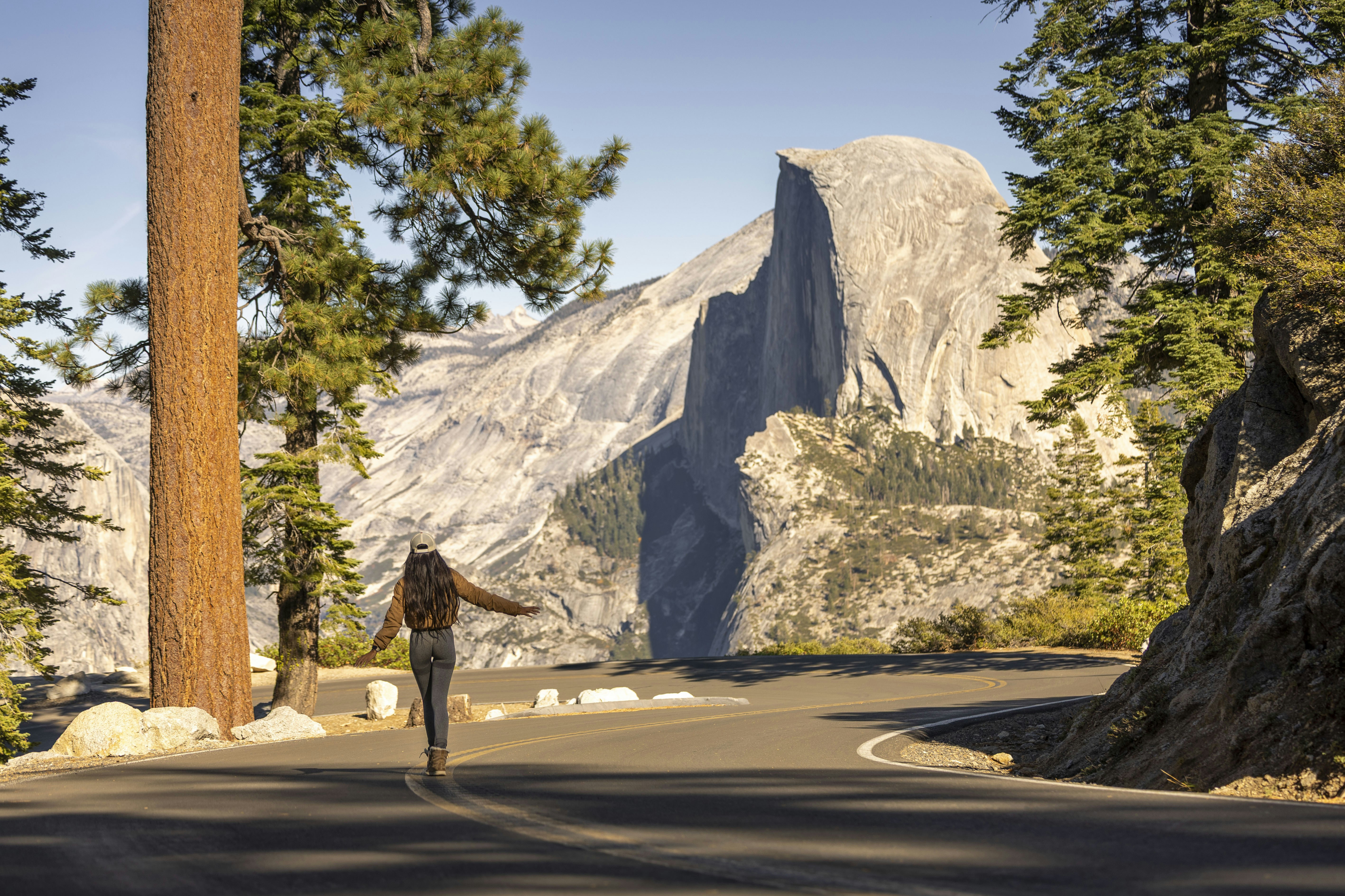 Solitary Stroll Under Granite Giants