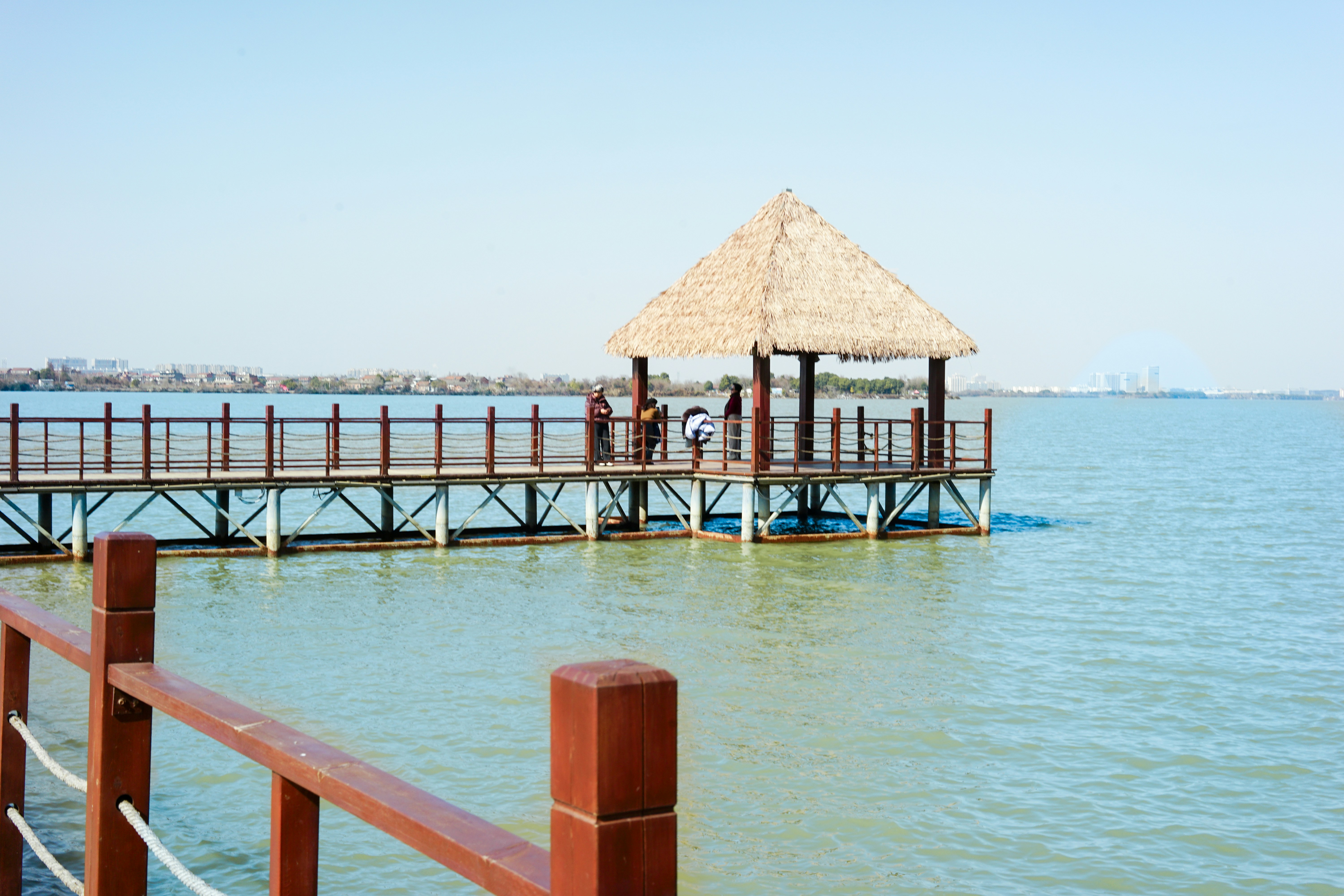 Thatched Gazebo Over Quiet Turquoise Waters