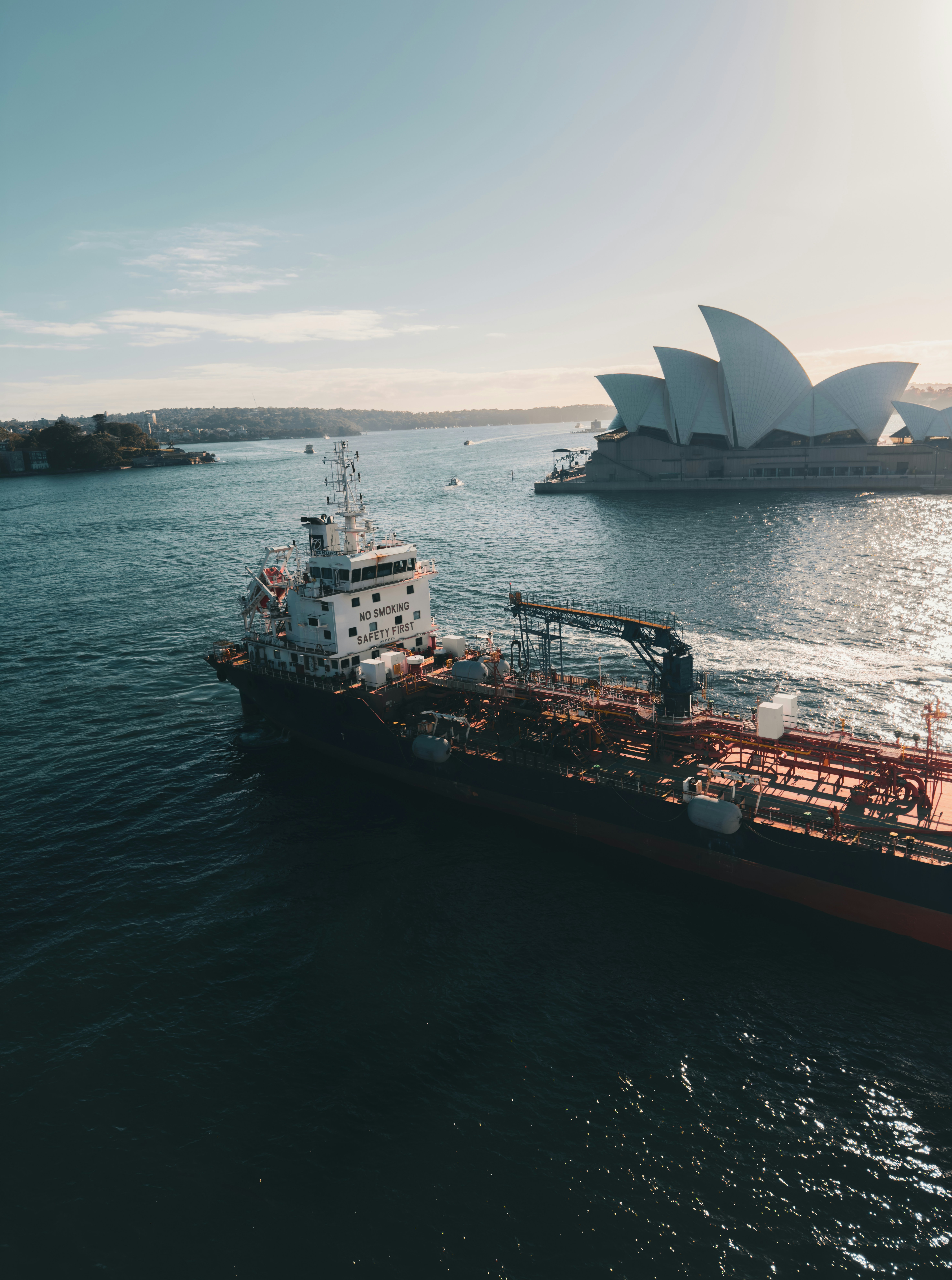 Harbor Galley Rising: A Tug Passes by the Opera House