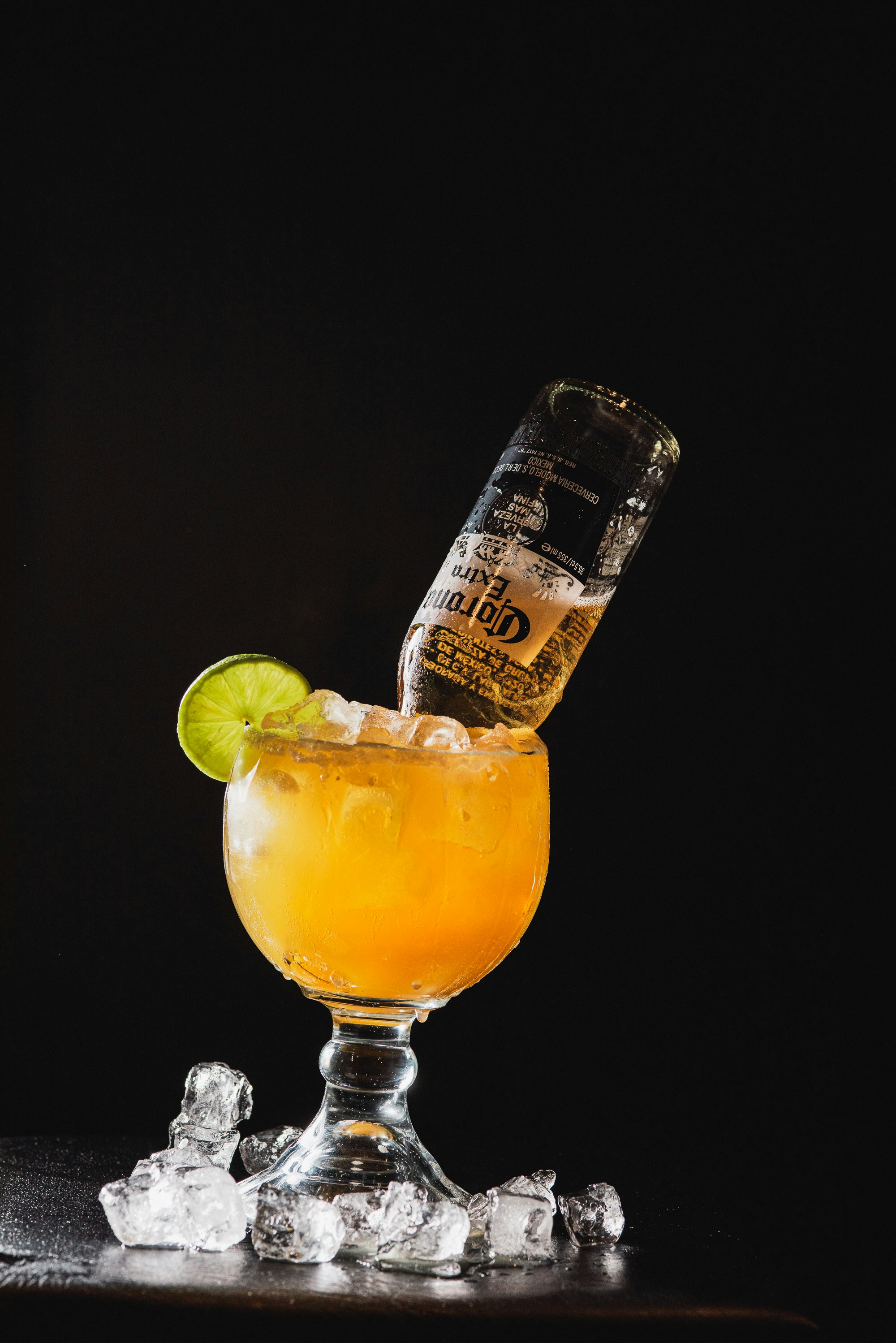 Citrus Burst on Ice: A Corona-tipped Cocktail Moment