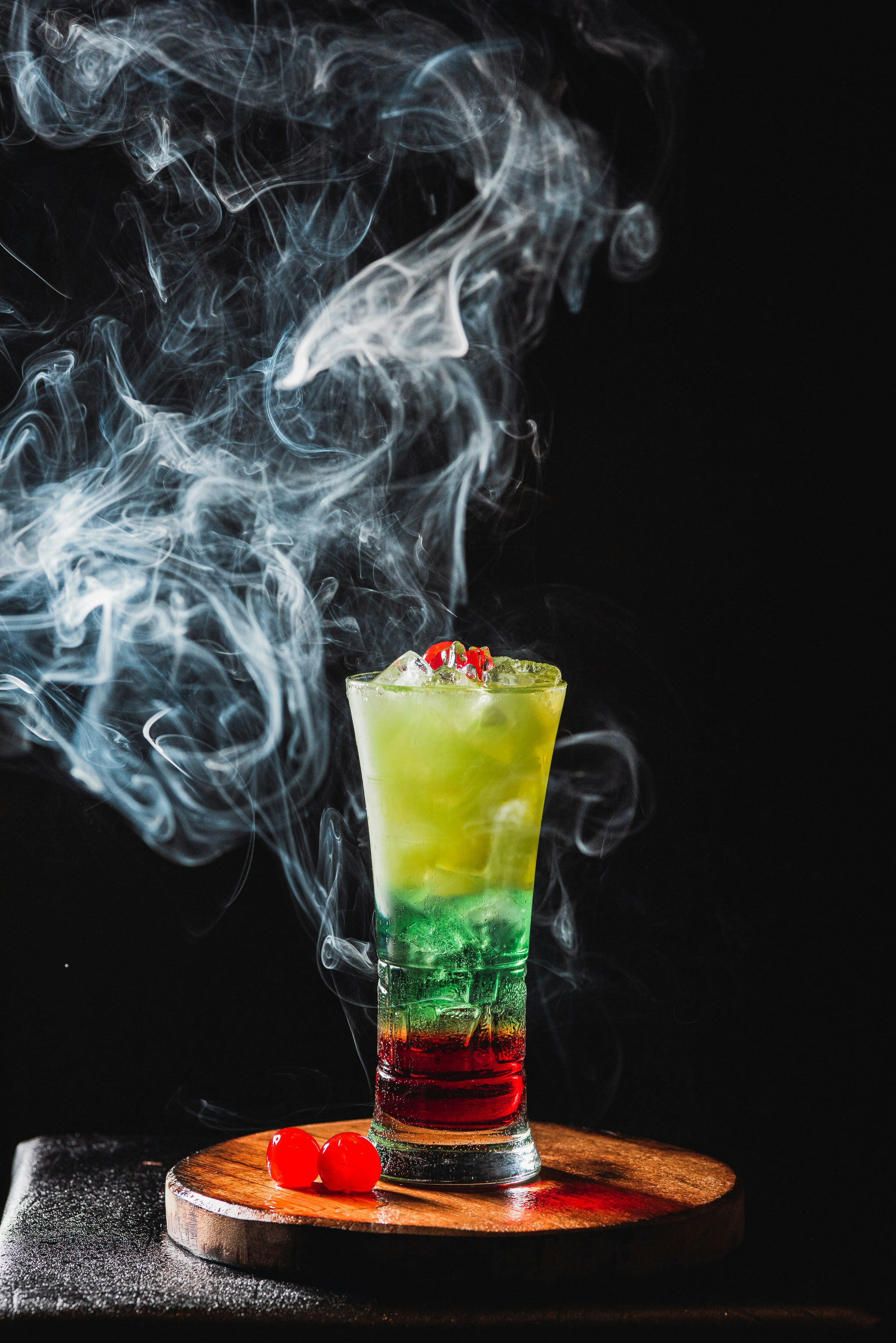 Smoked Citrus Cascade: A Neon-Tinted Cocktail Reimagined