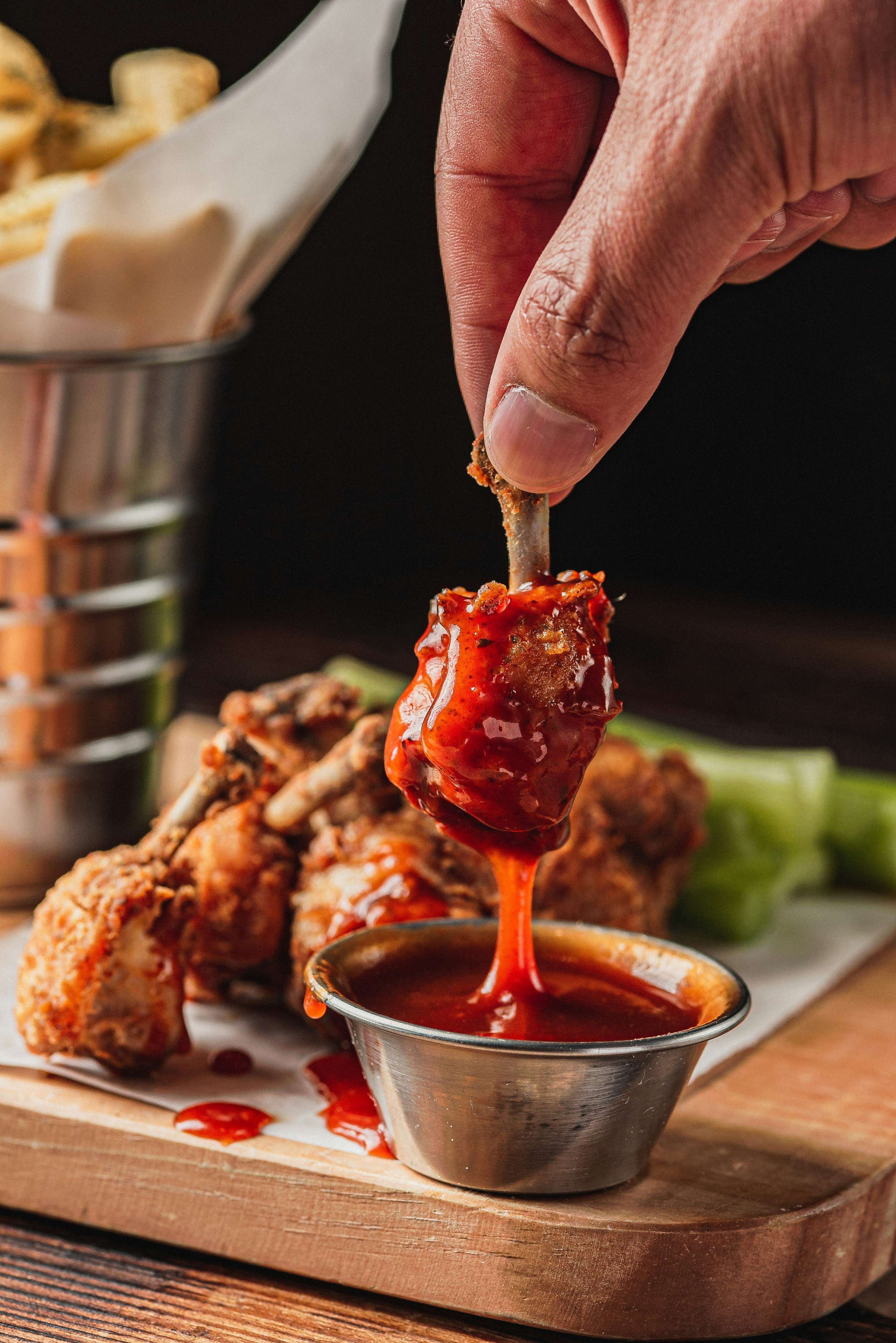 Sticky Daring Bite: A Hand-Dipped Sauceglazed Fry Lift