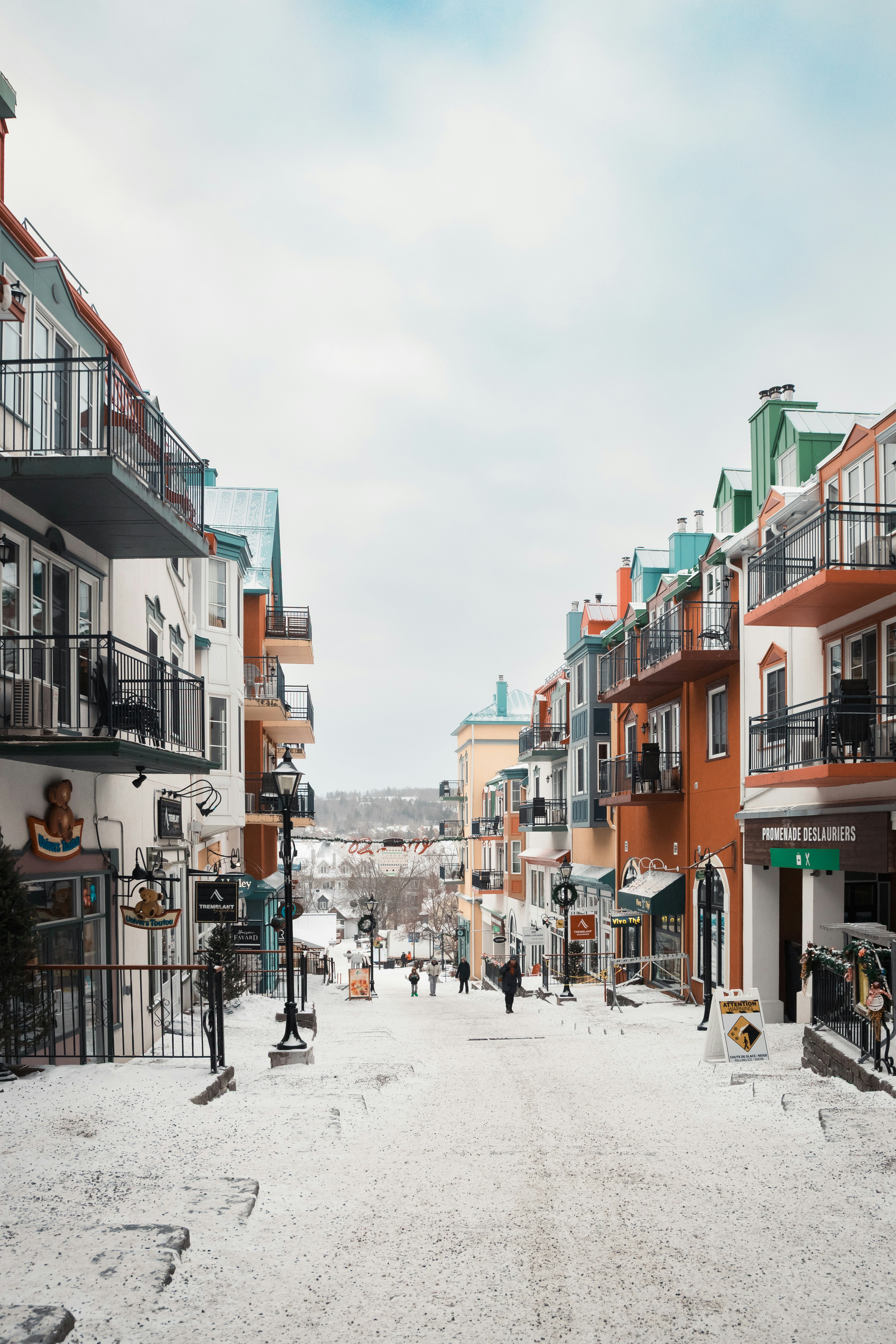 Snowy Calle: A Colorful Row of Alpine Townhouses Down the Frozen Street