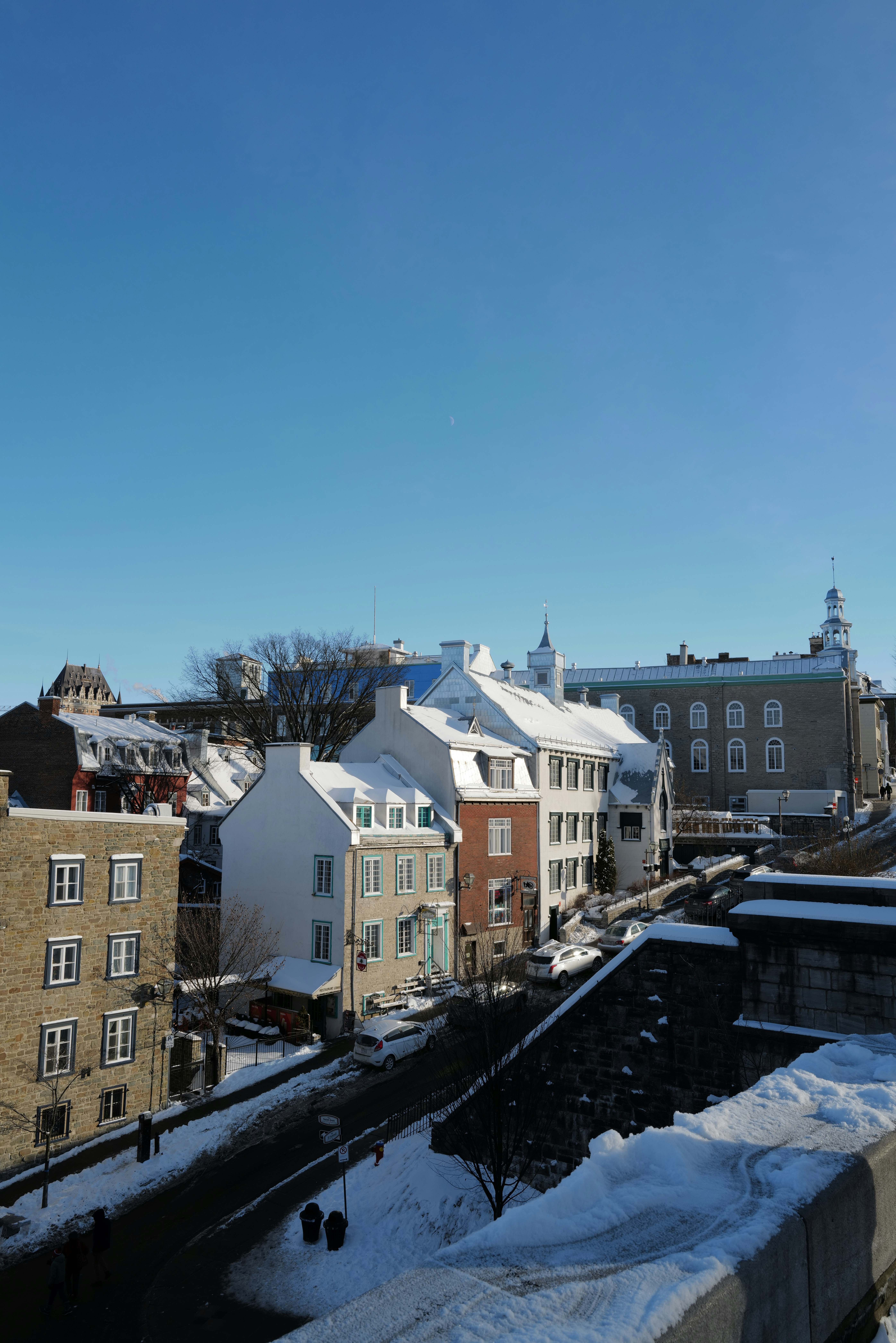 Snow-Capped Row Houses Under a Clear Winter Sky