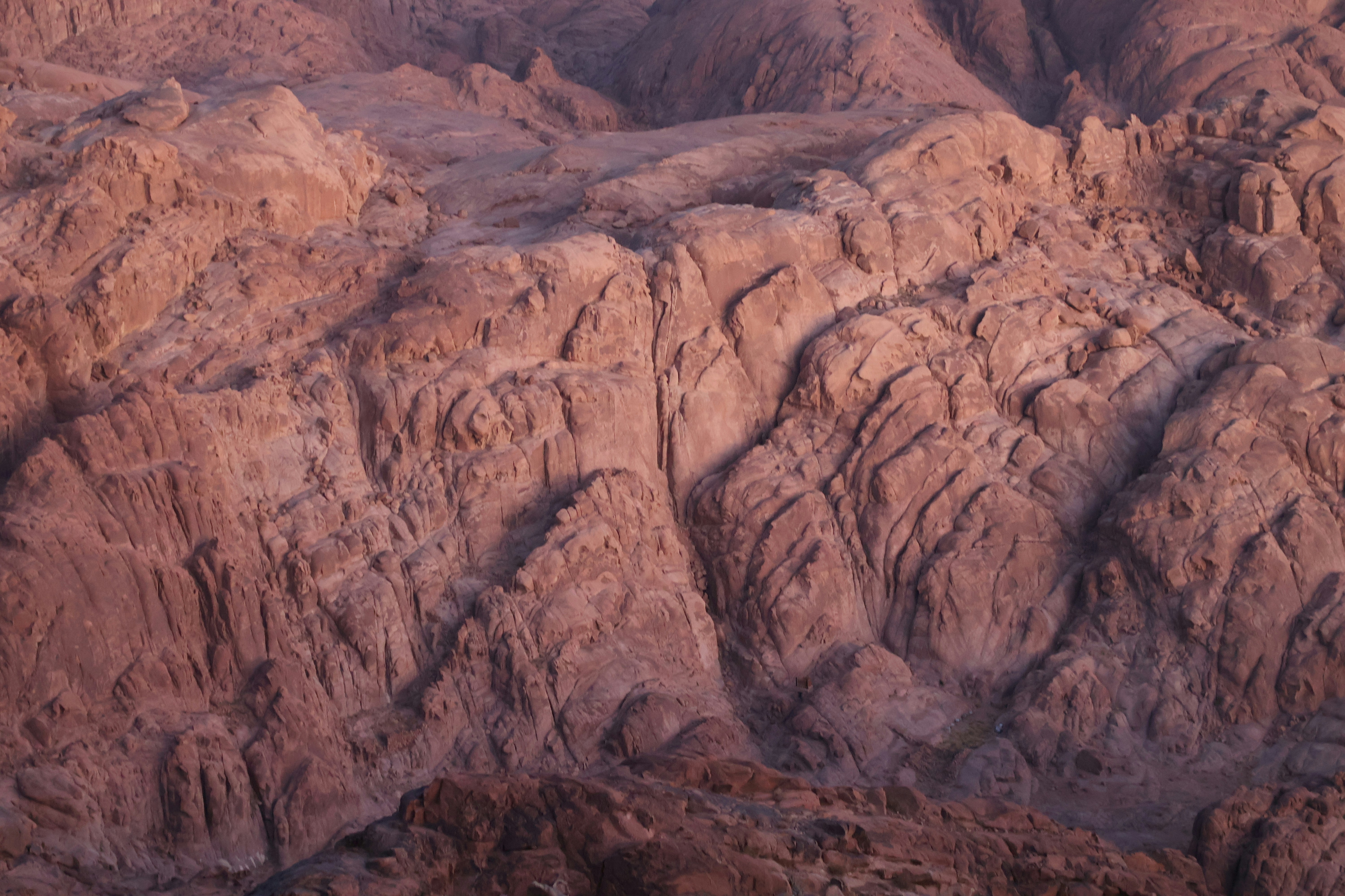 Rugged desert mountains bathed in soft light