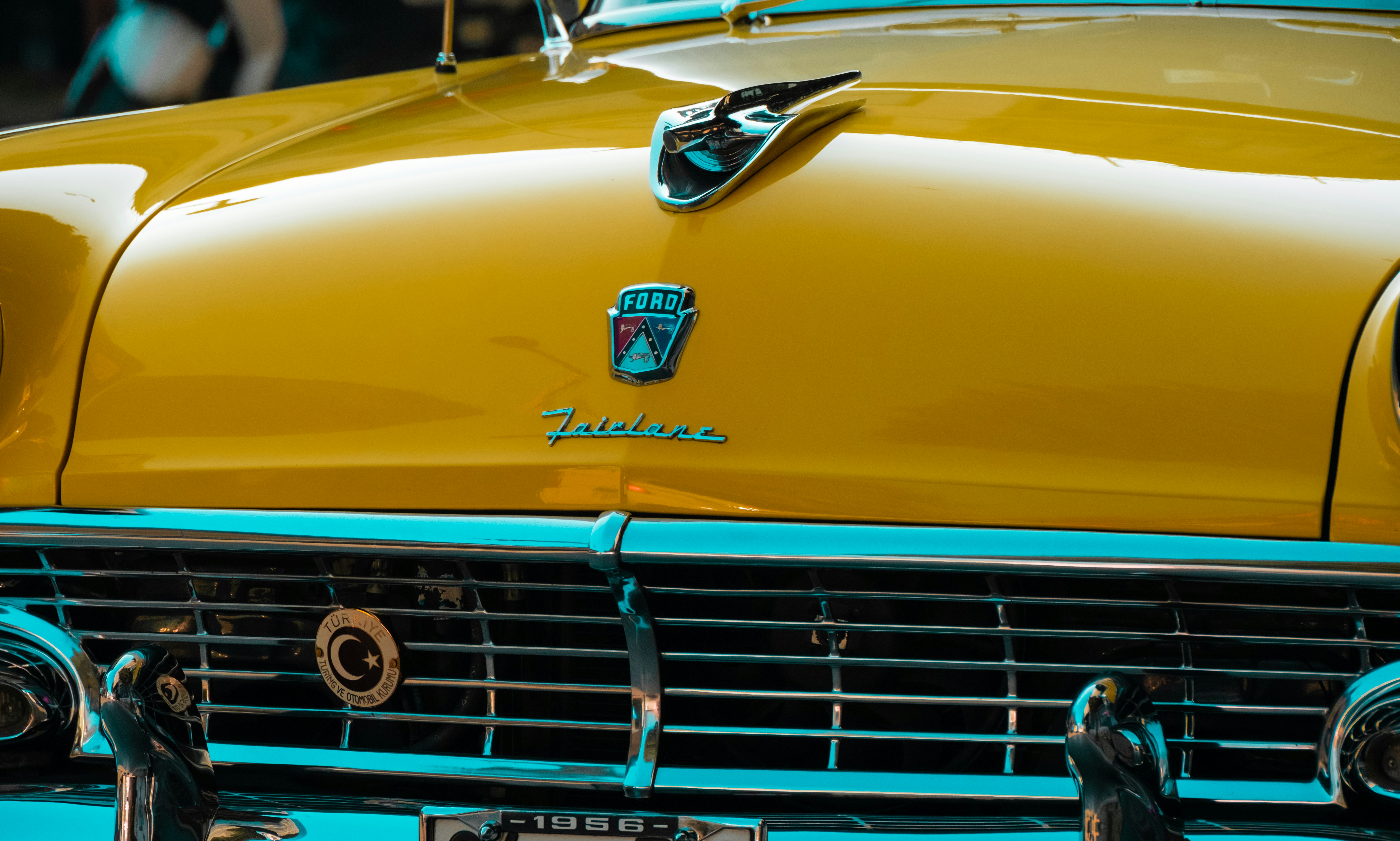Golden Classic Grille: Ford Thunderbird emblem in sunlit chrome