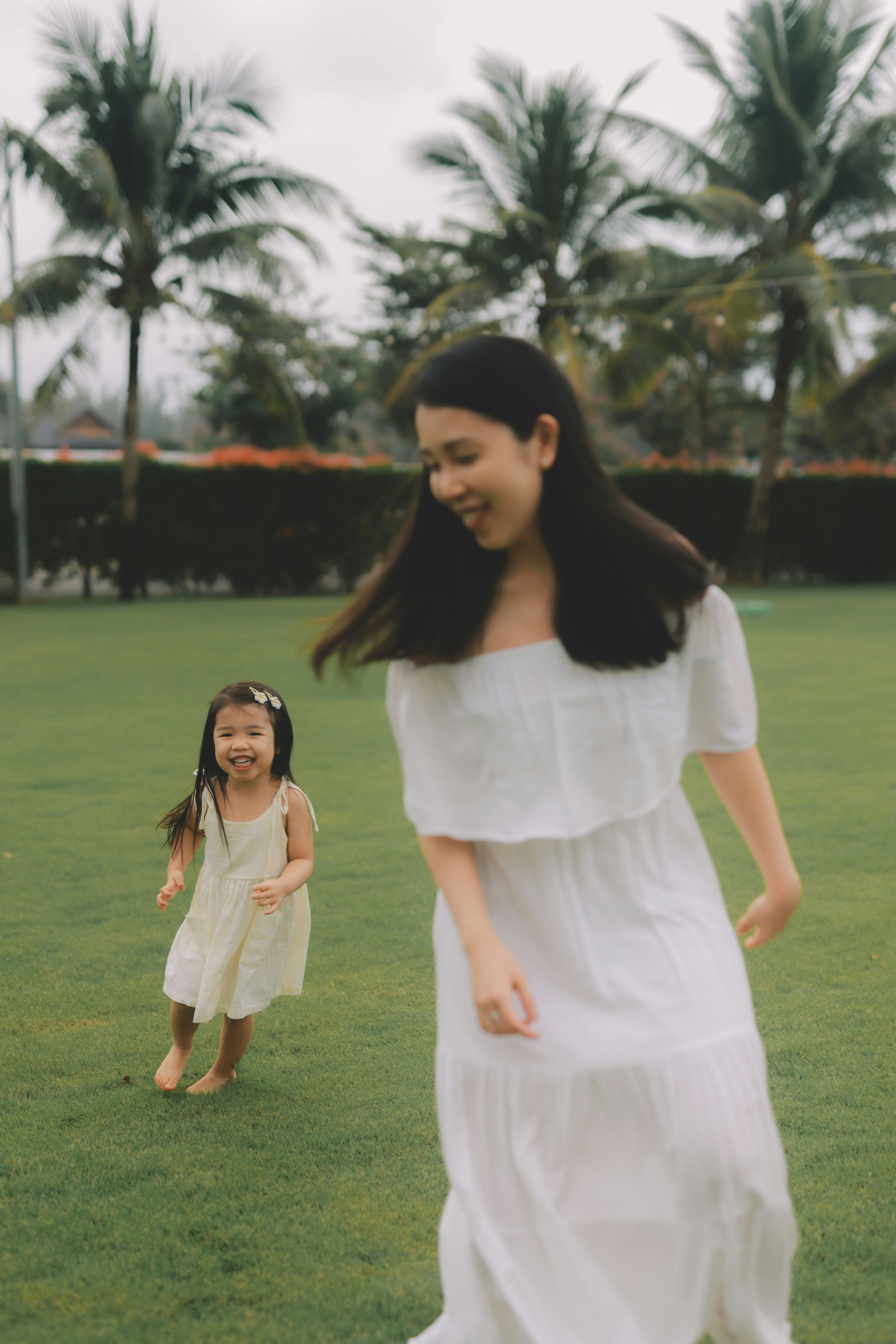 Dancing in the Lawn: A Mother and Daughter in White