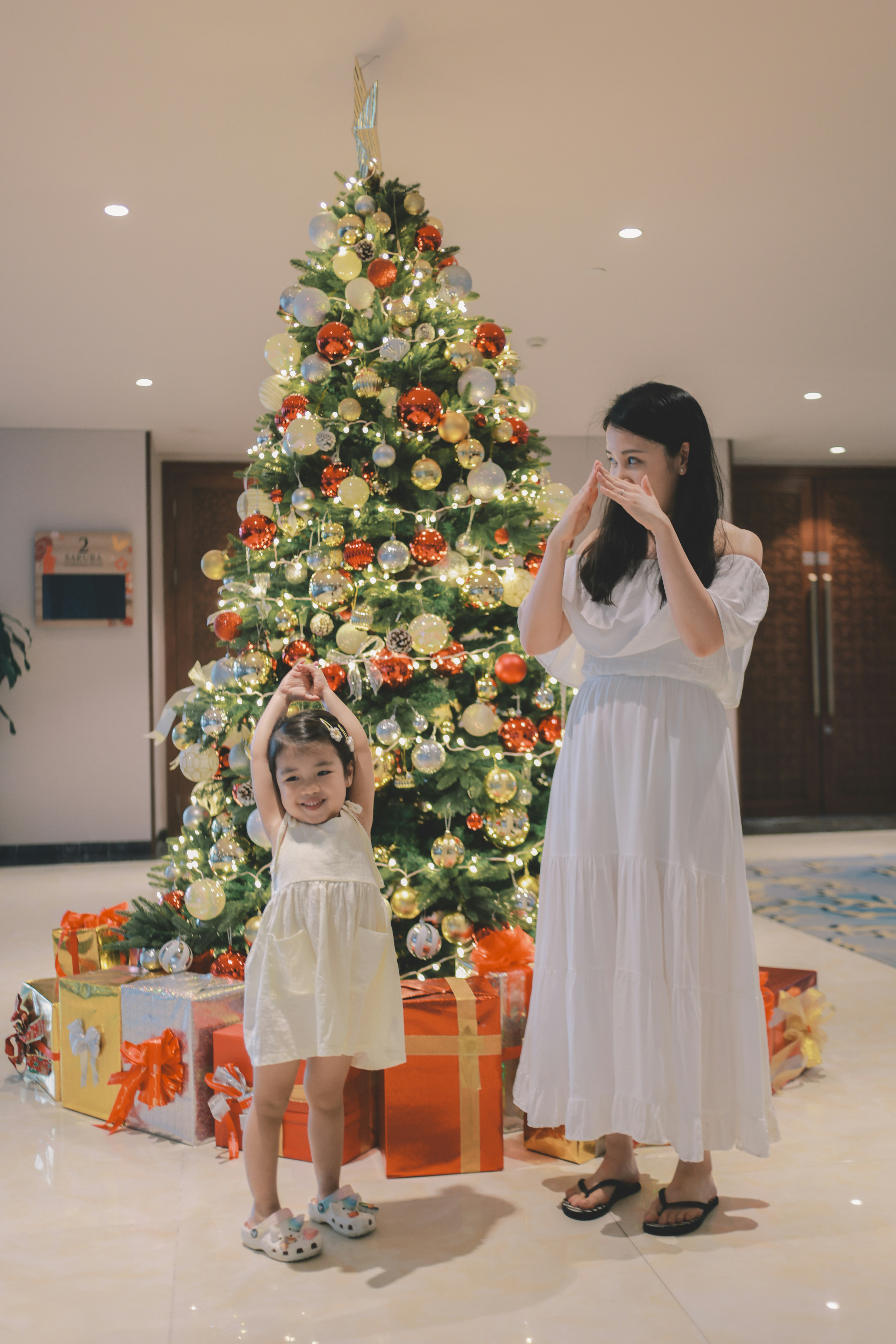 Whimsy Under the Christmas Tree: A Tender Moment