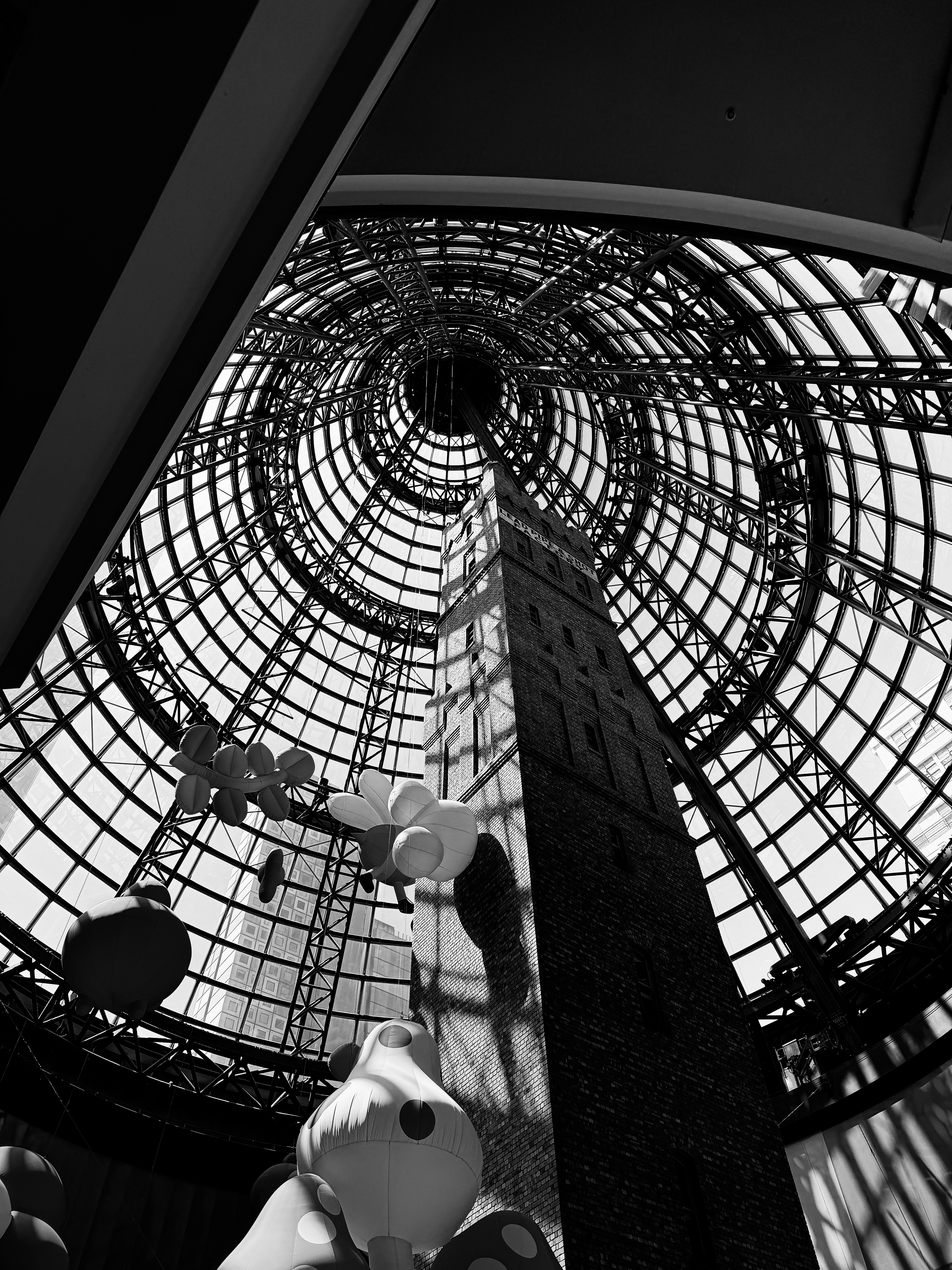 Circular Glass Atria: A Tower Reaches into a Geometric Sky