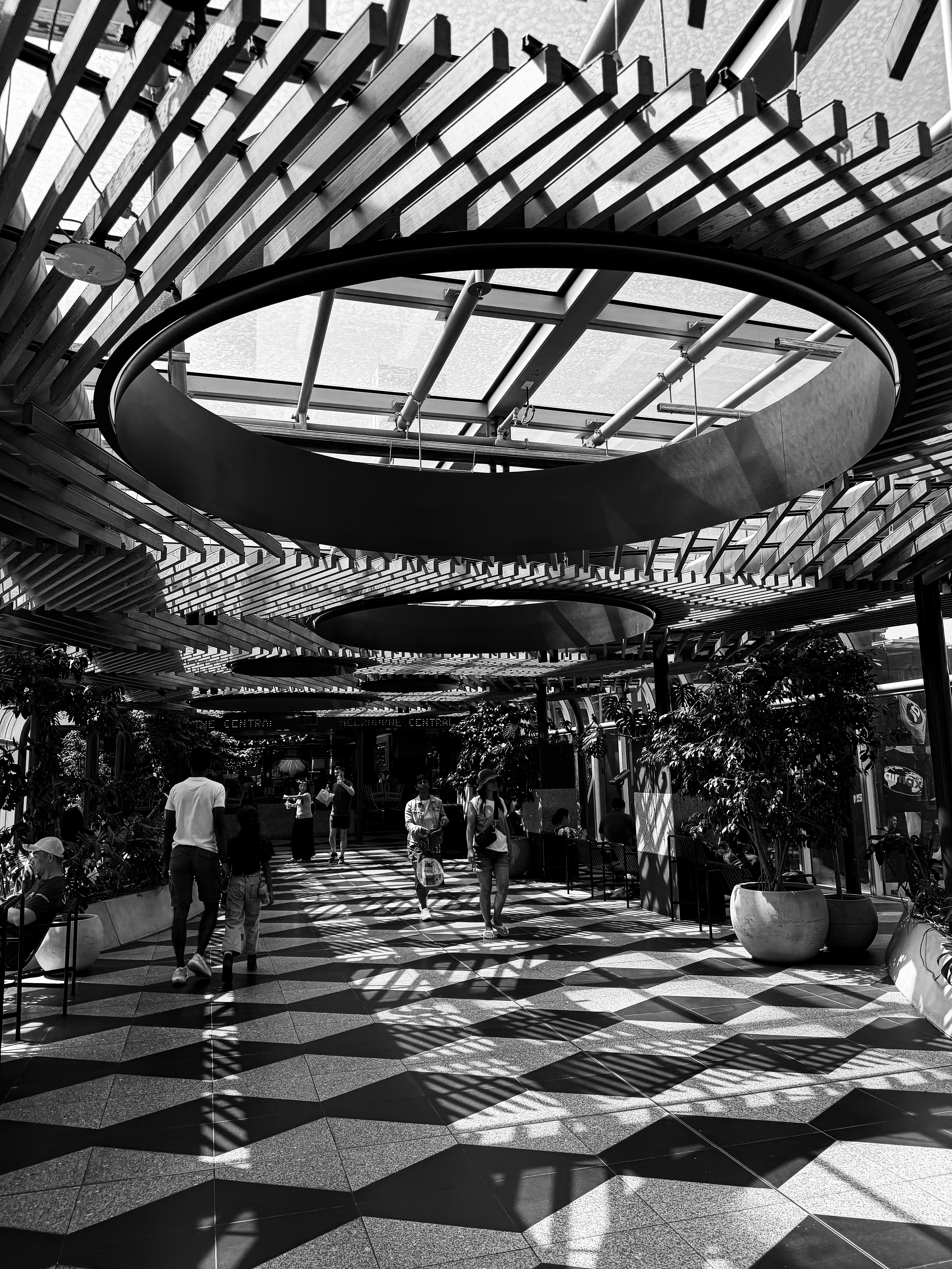 Shaded Corridor: Geometric Light Beats and Circular Roof Orbits