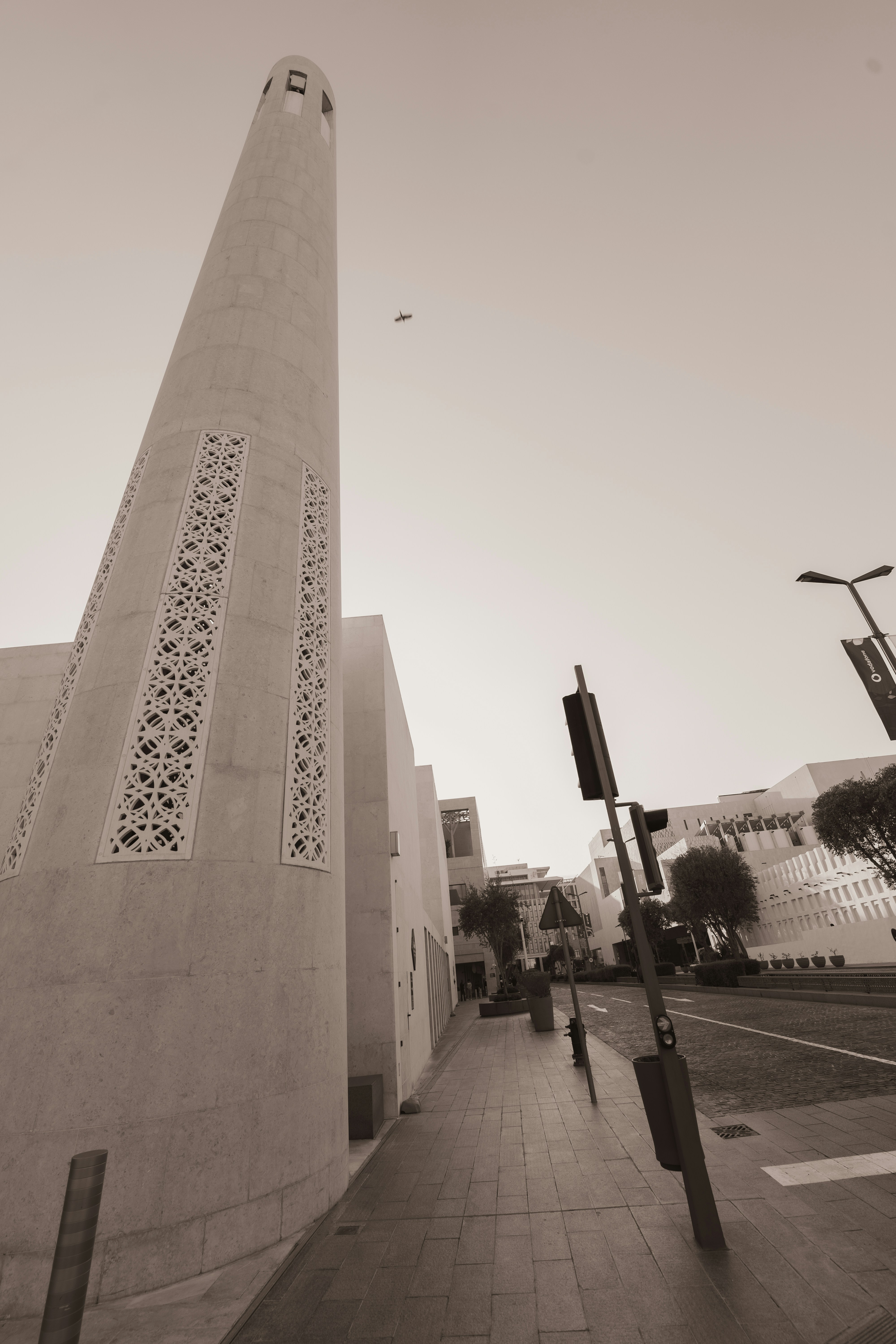 Monumental Corner: A Tilted Tower Anchoring a Quiet Street