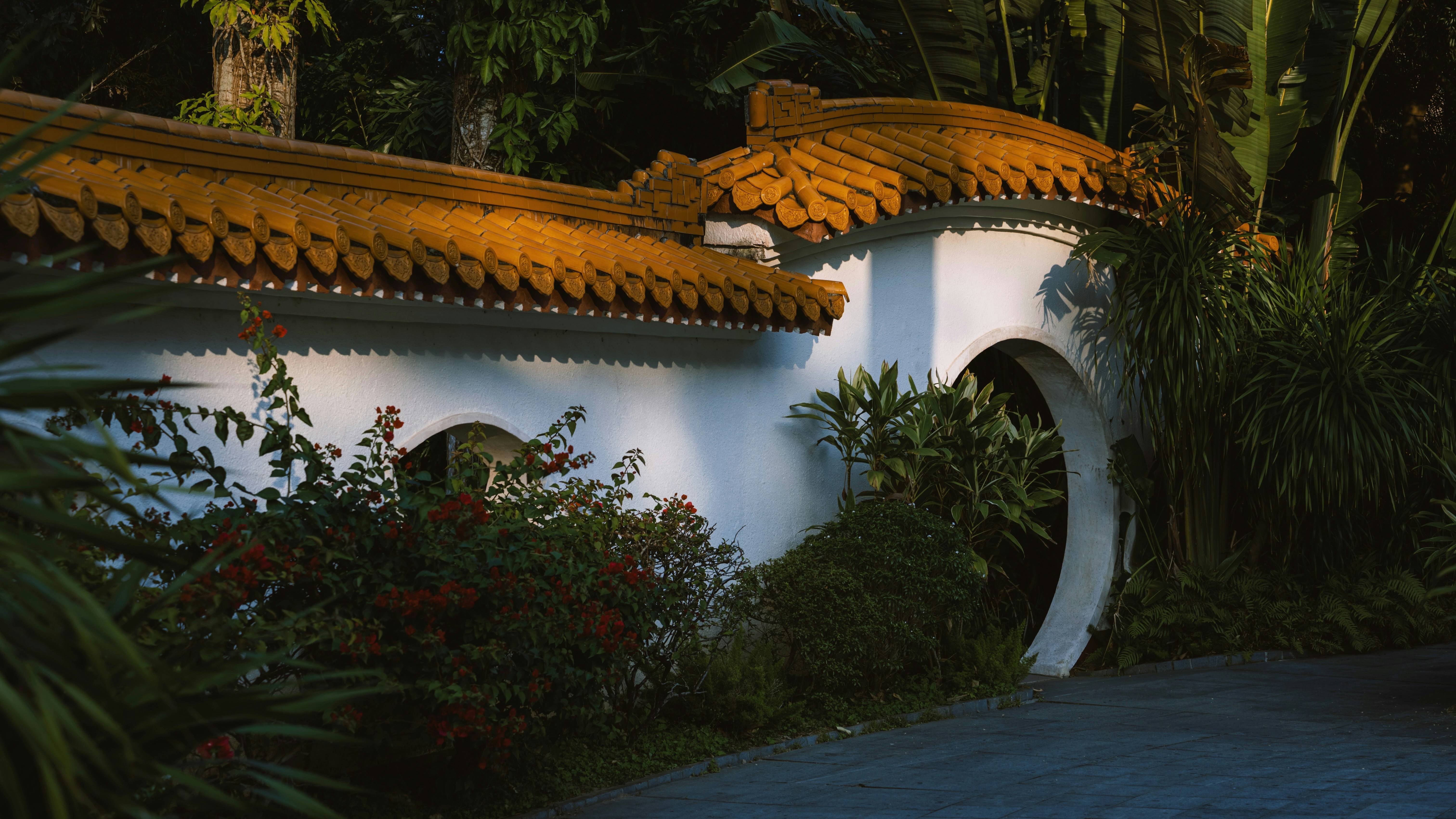 Curved Gatehouse in a Quiet Tropical Garden