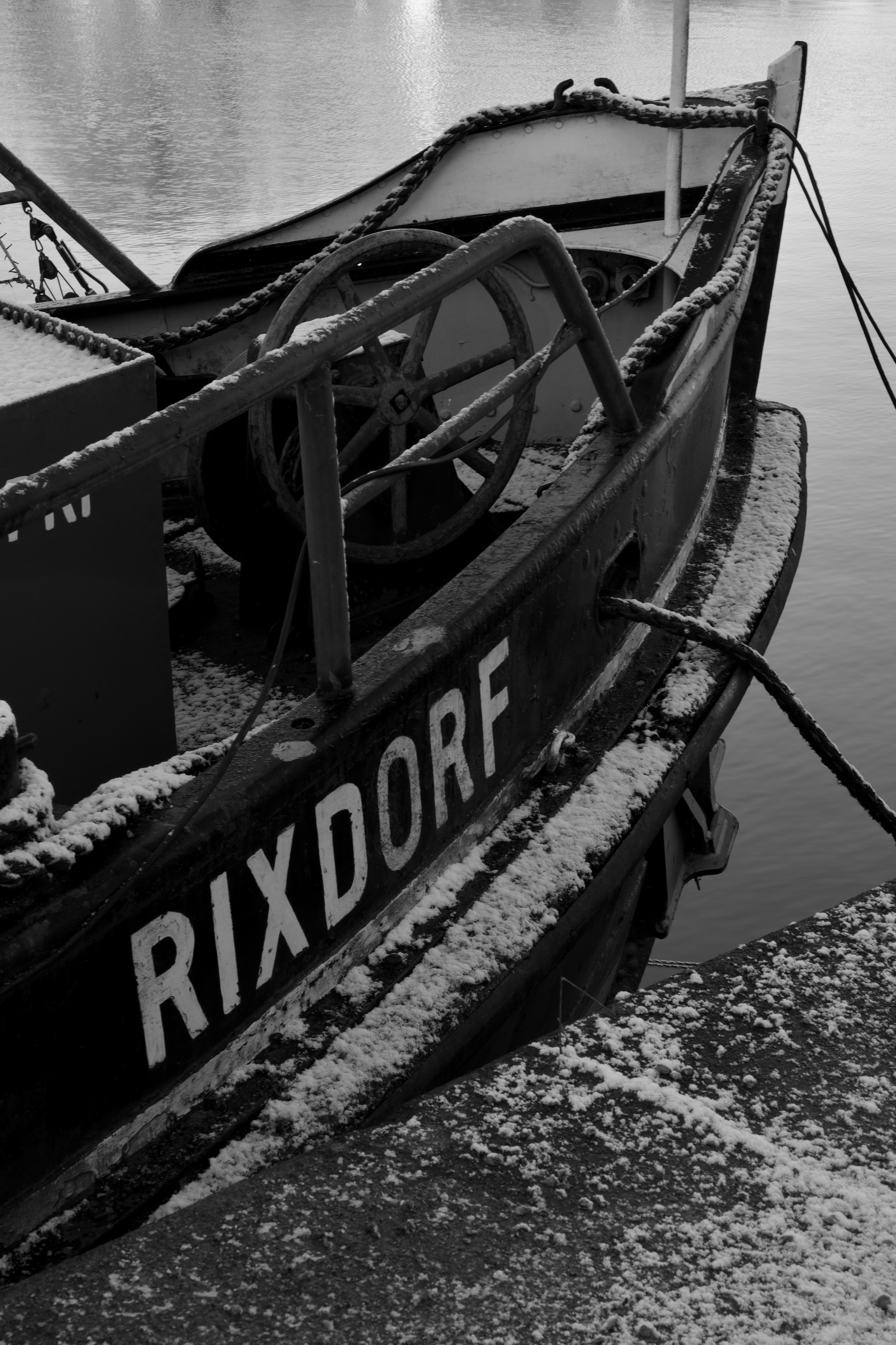 Rusted Vessel, Snow-kissed Dock