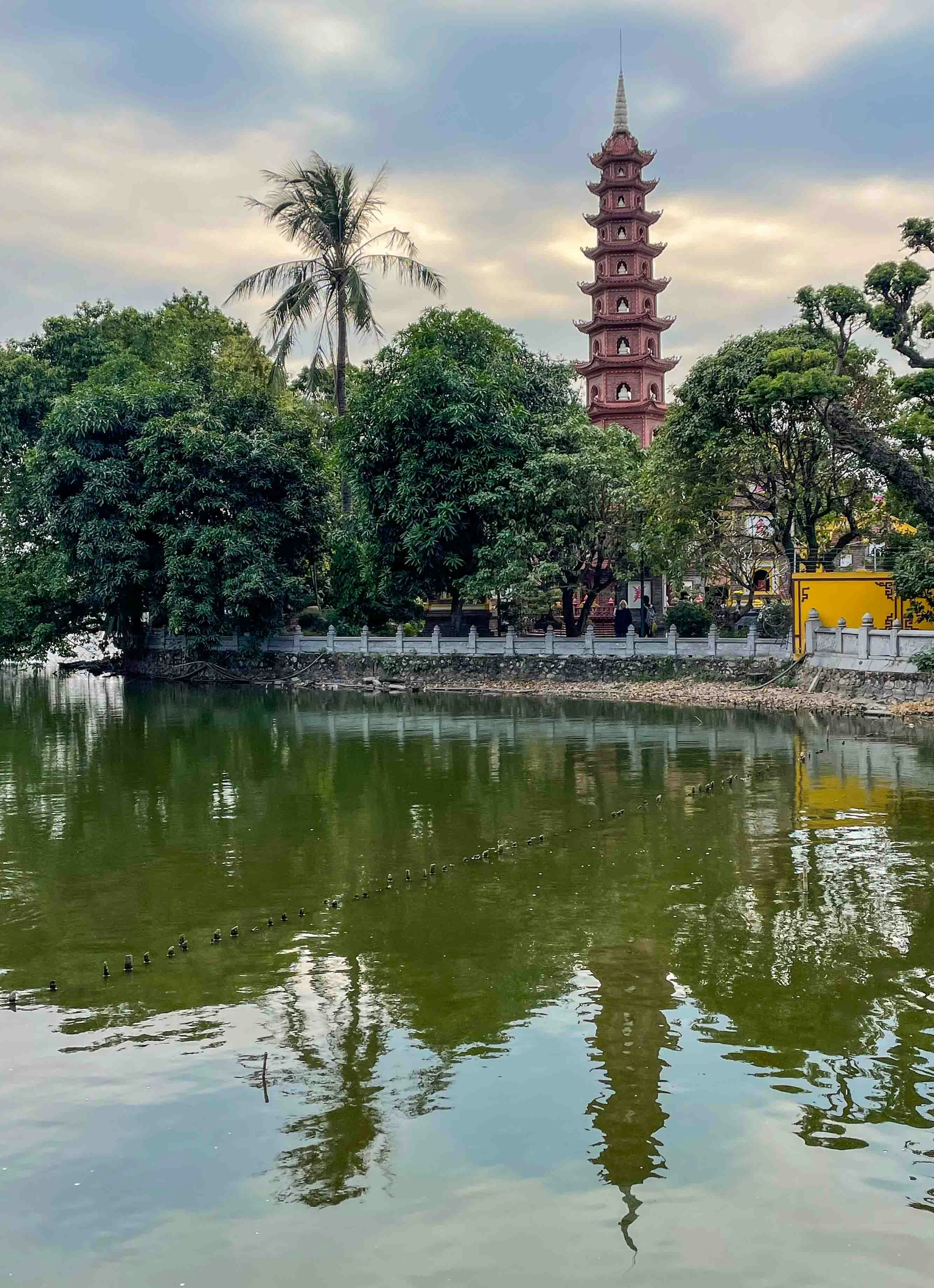 Pagoda Skyline Over Quiet Lake