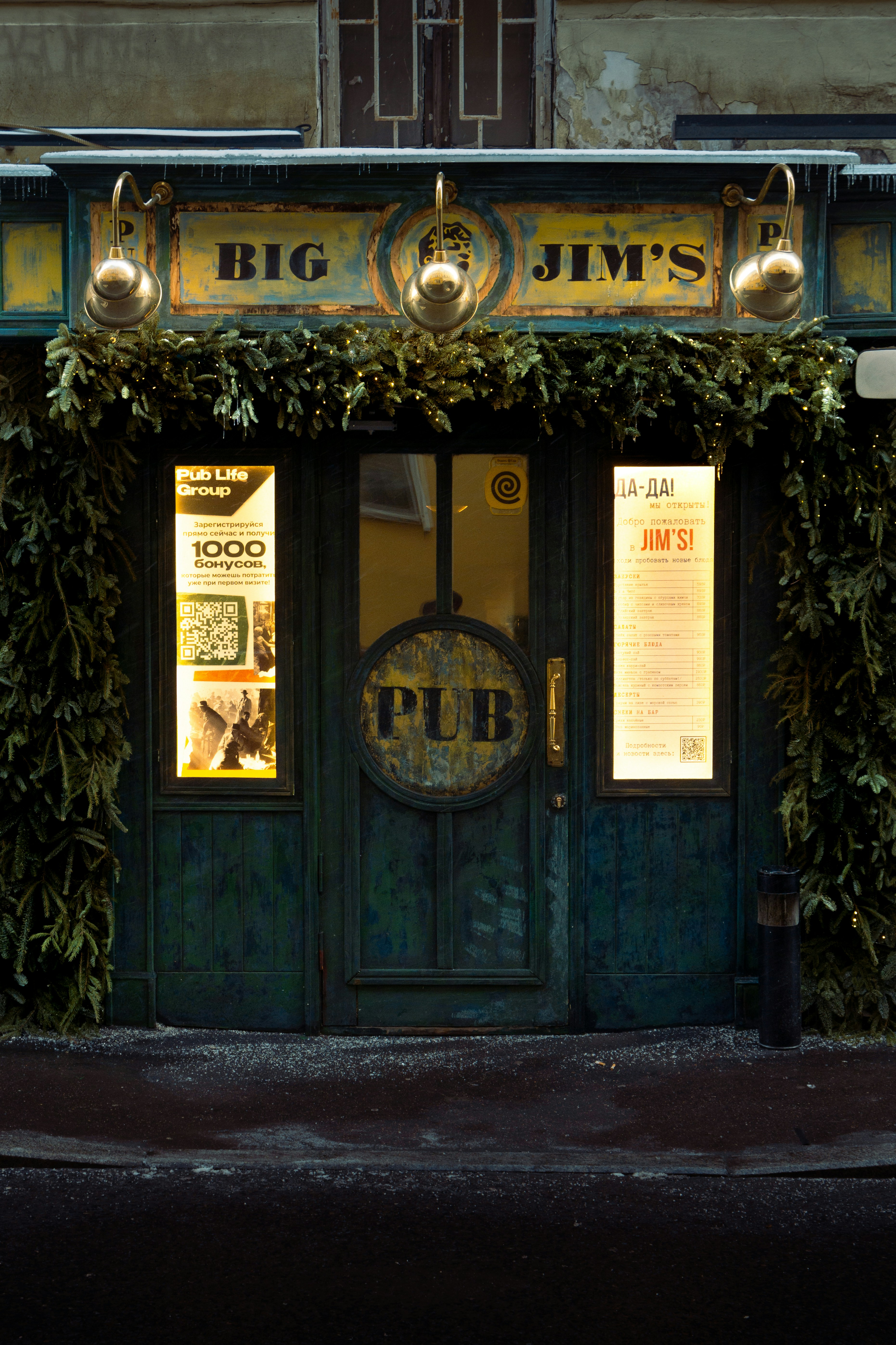 Big jim's pub entrance decorated for winter