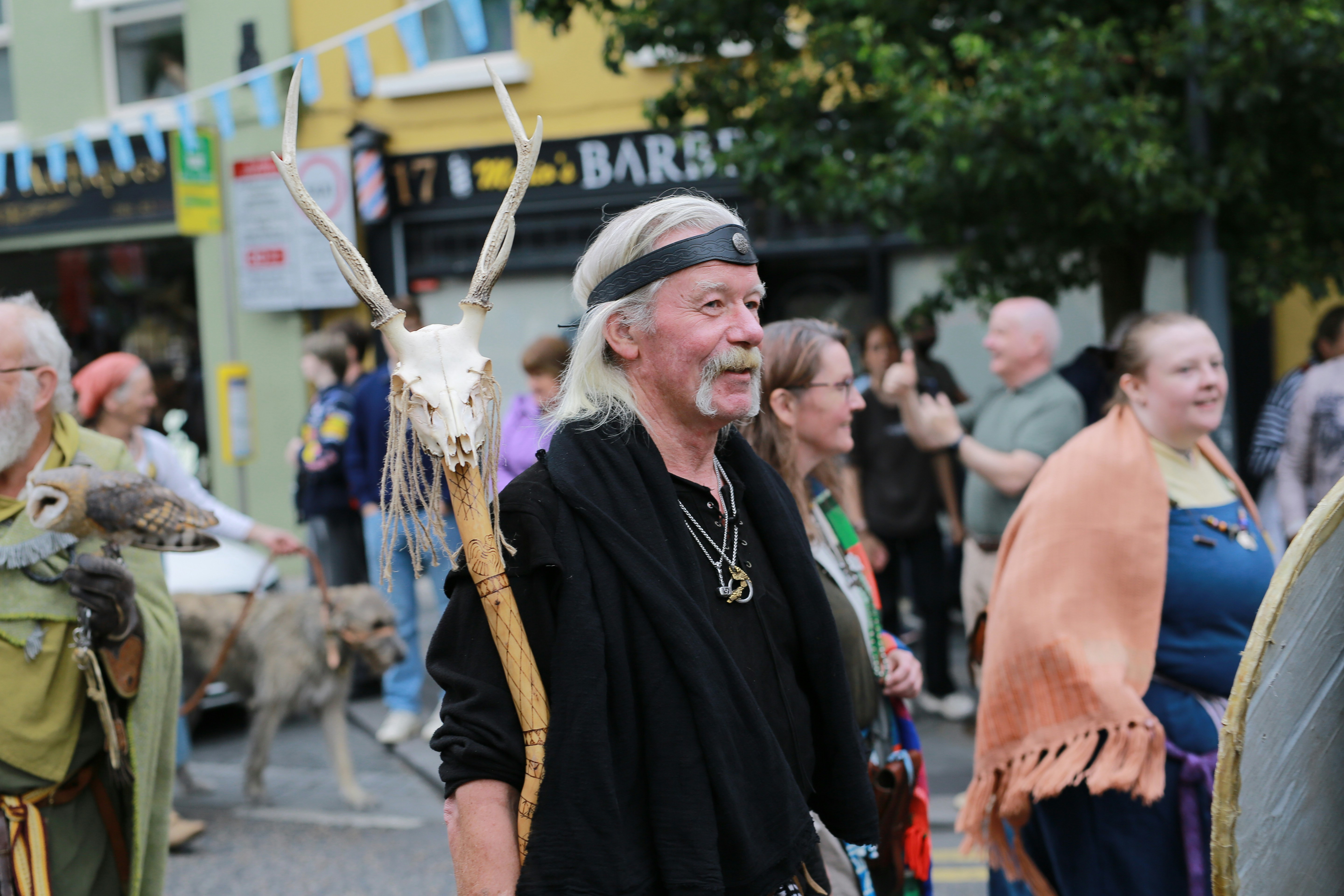 The Sage of the Street: A Midnight Ritual in Multicolored Marches