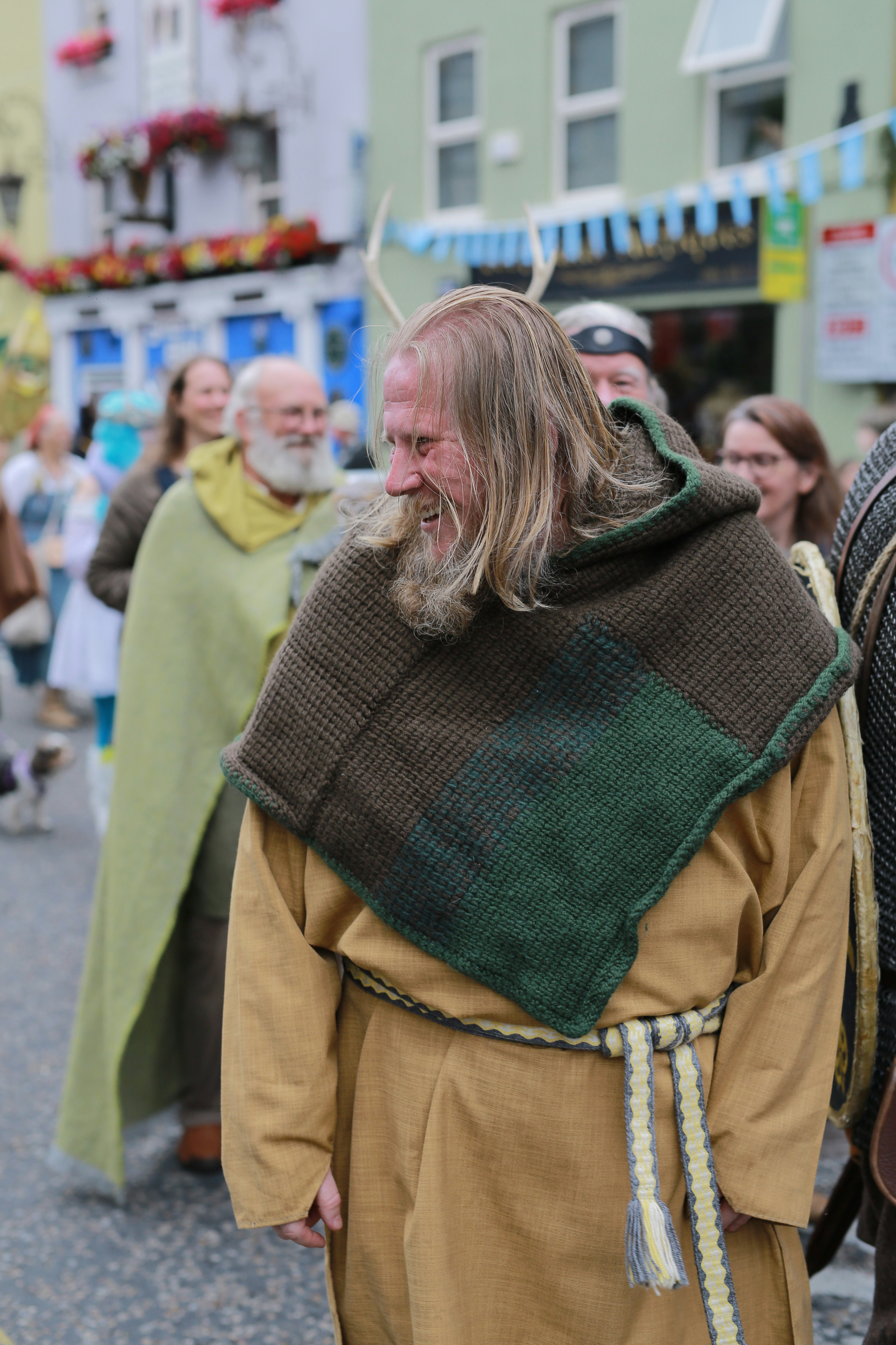 Roving Friar in a Colorful Street Festival