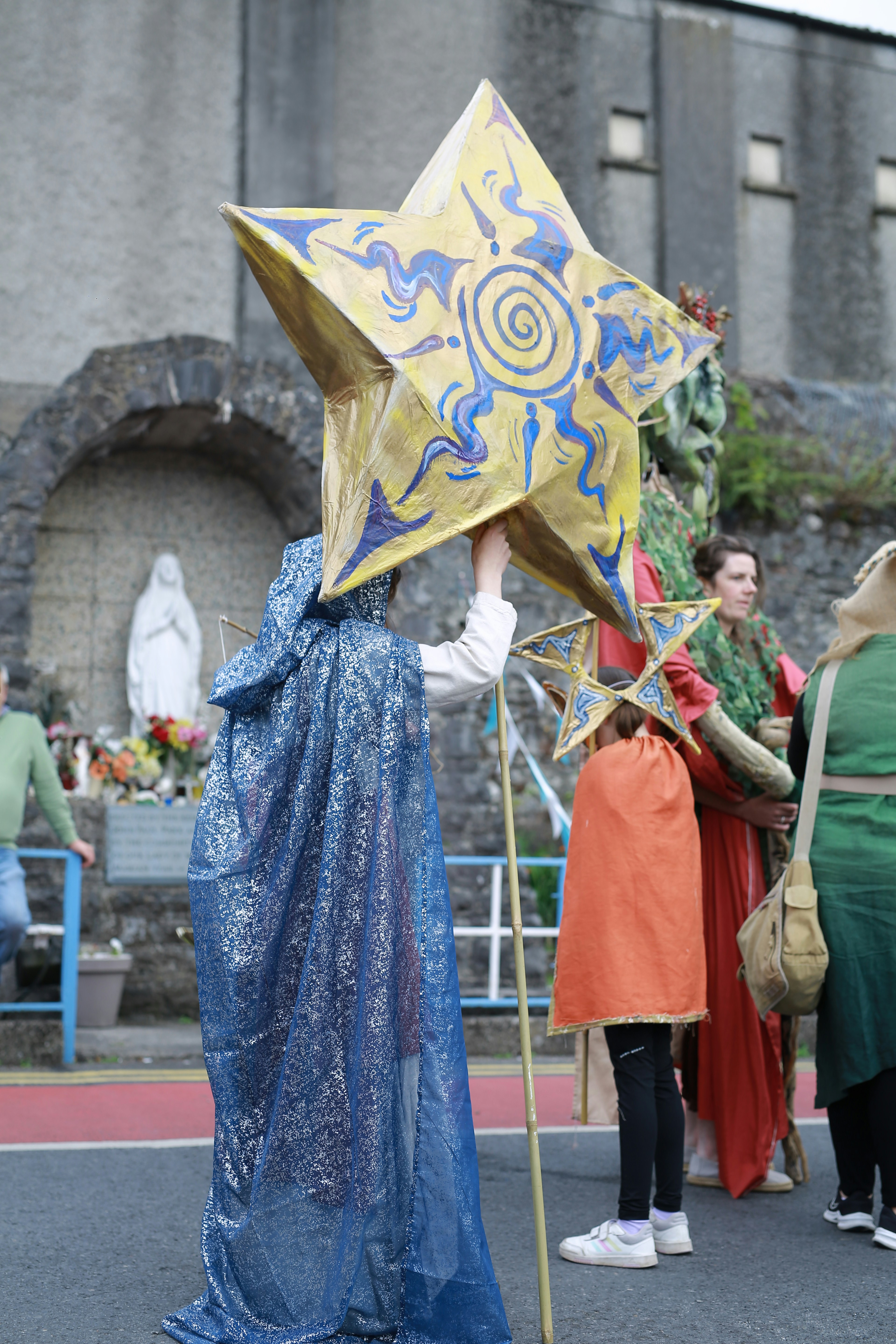 Star of Tradition: A Costumed Parade with a Painted Star