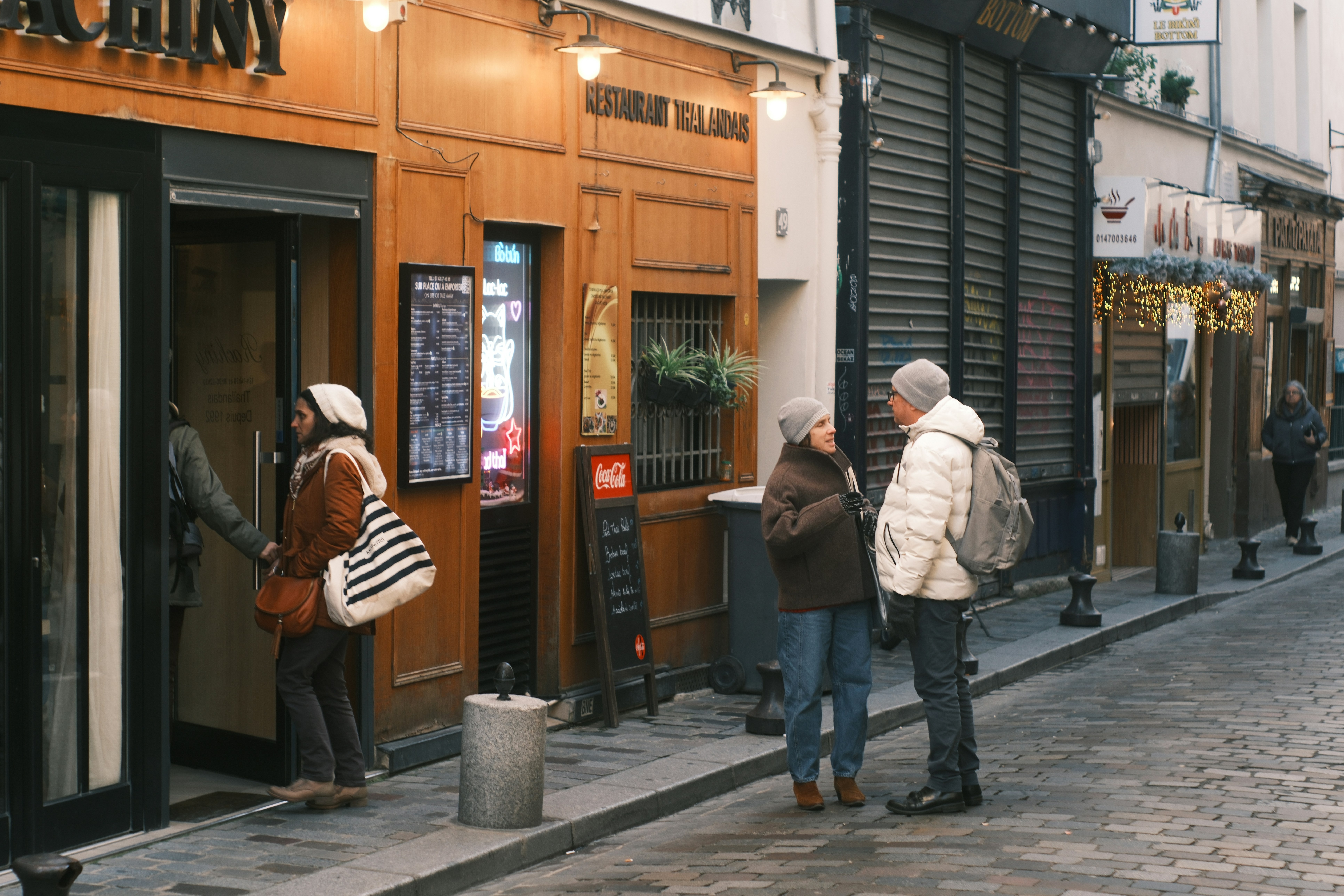 Street Conversation at a French Alley Café
