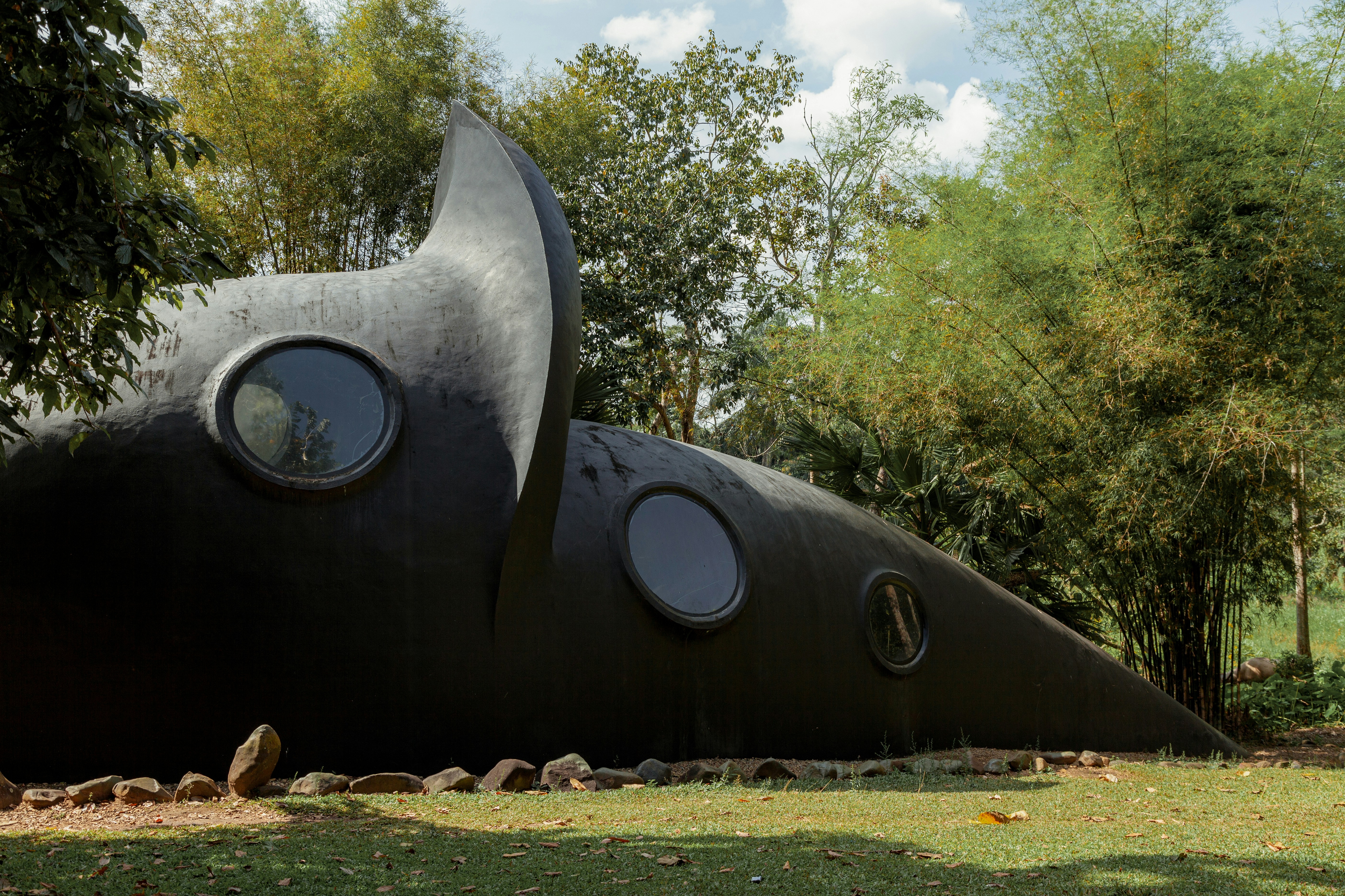 Sunken marvel: an industrial creature resting among green shadows