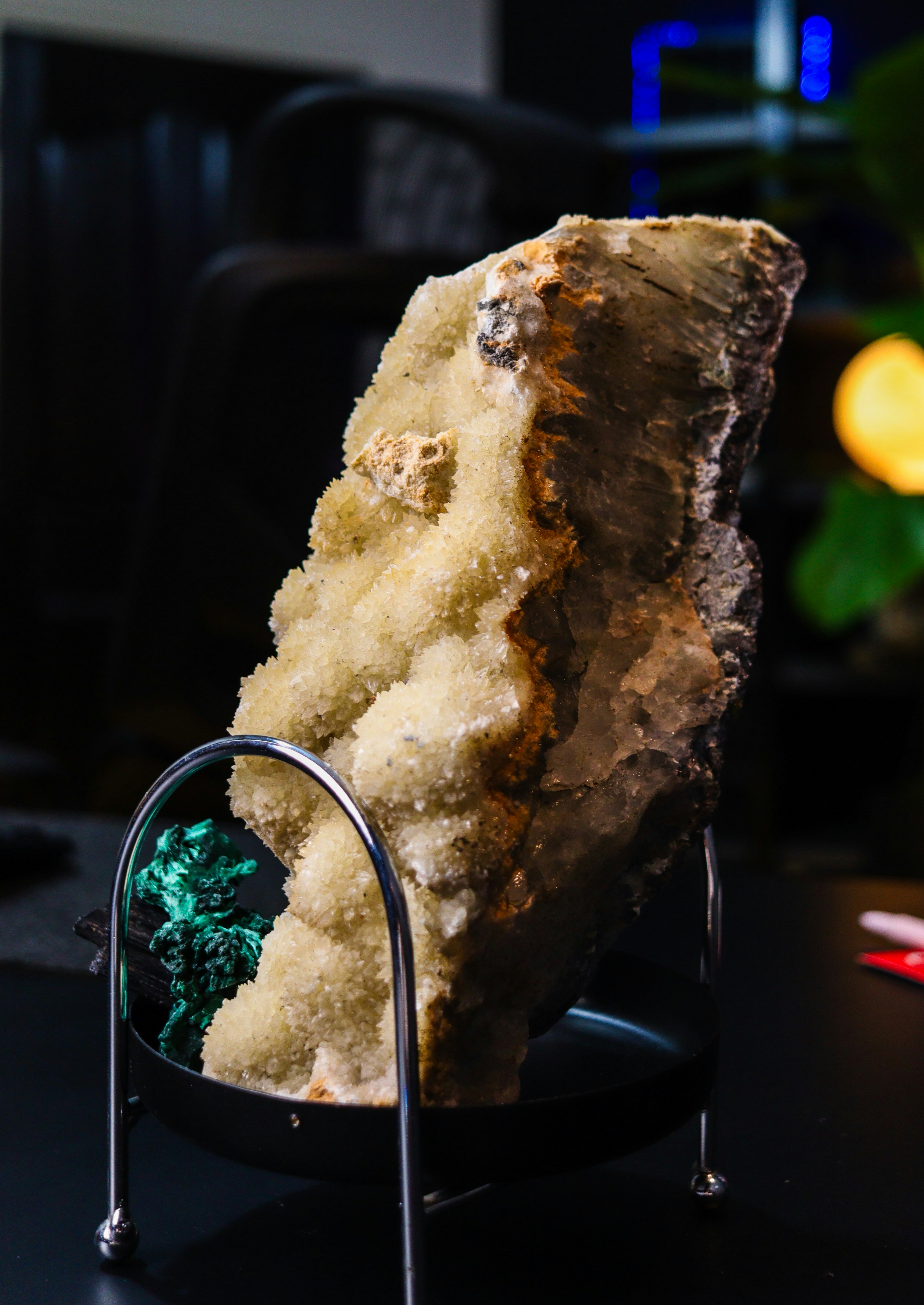Geode and mineral glow: a quartz stalagmite on a curved stand