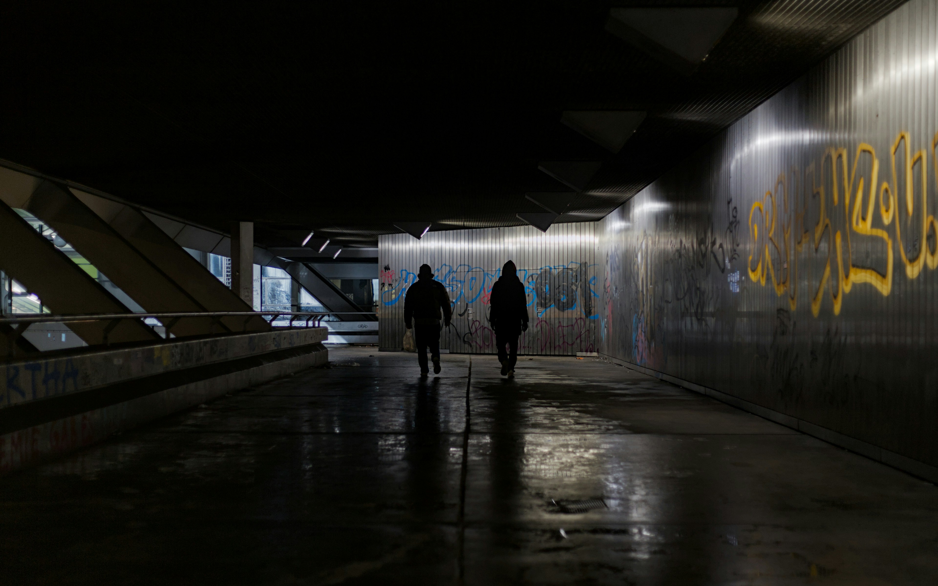 Footsteps in the Graffitied Corridor