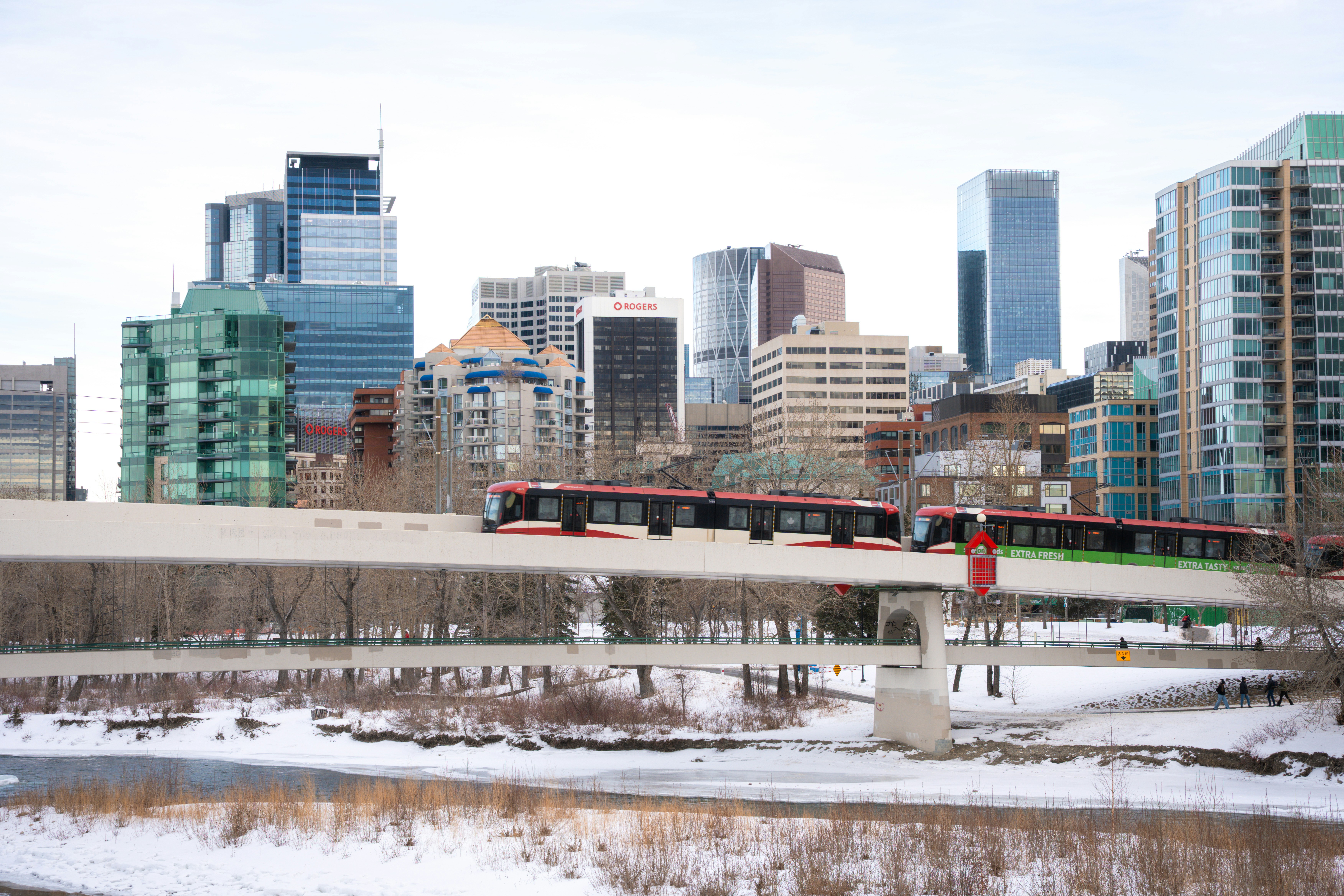 Bridge Transit Through a Snowy Cityscape