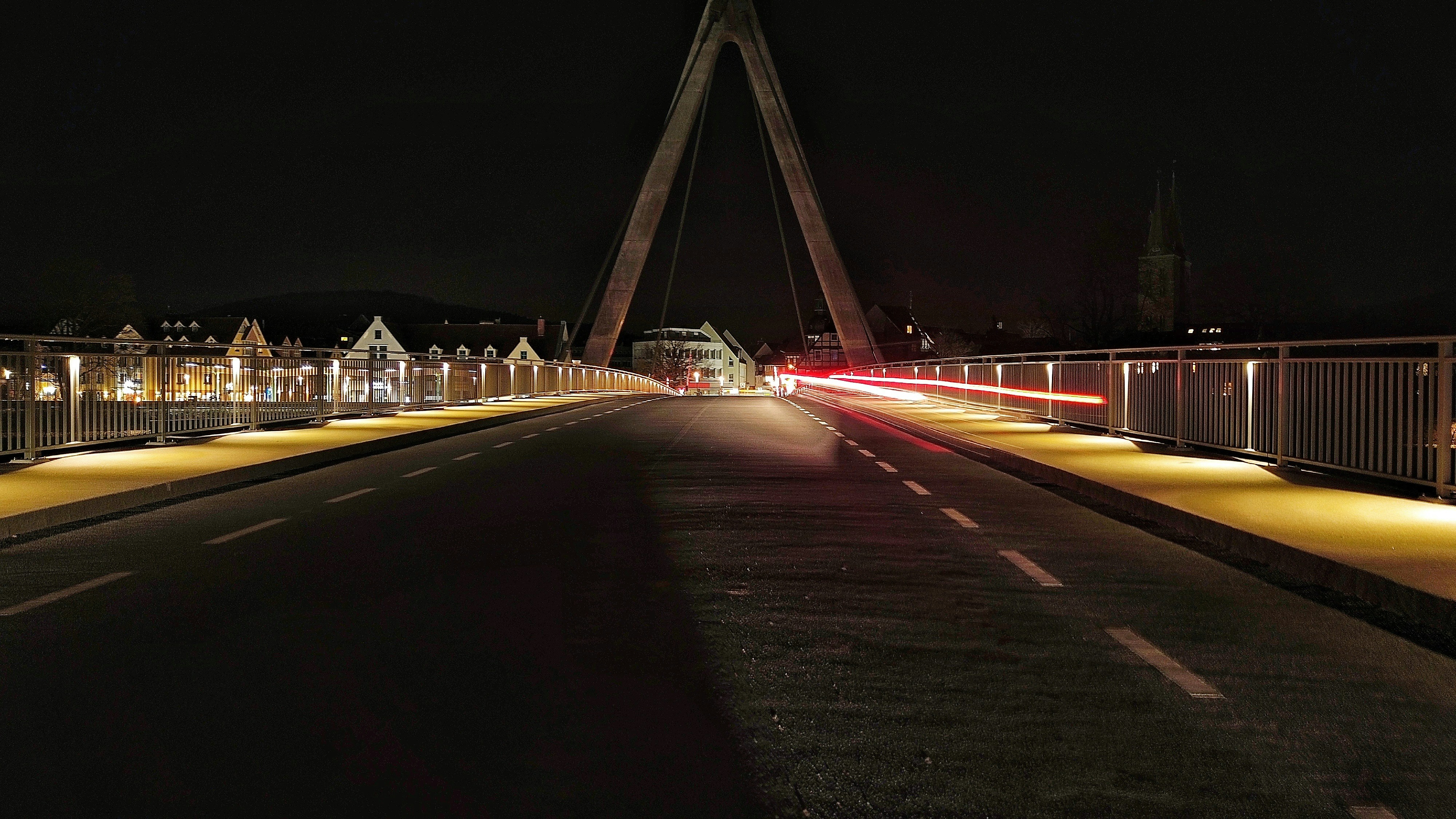 Night Bridge in Motion: A Quiet Span with Light Trails