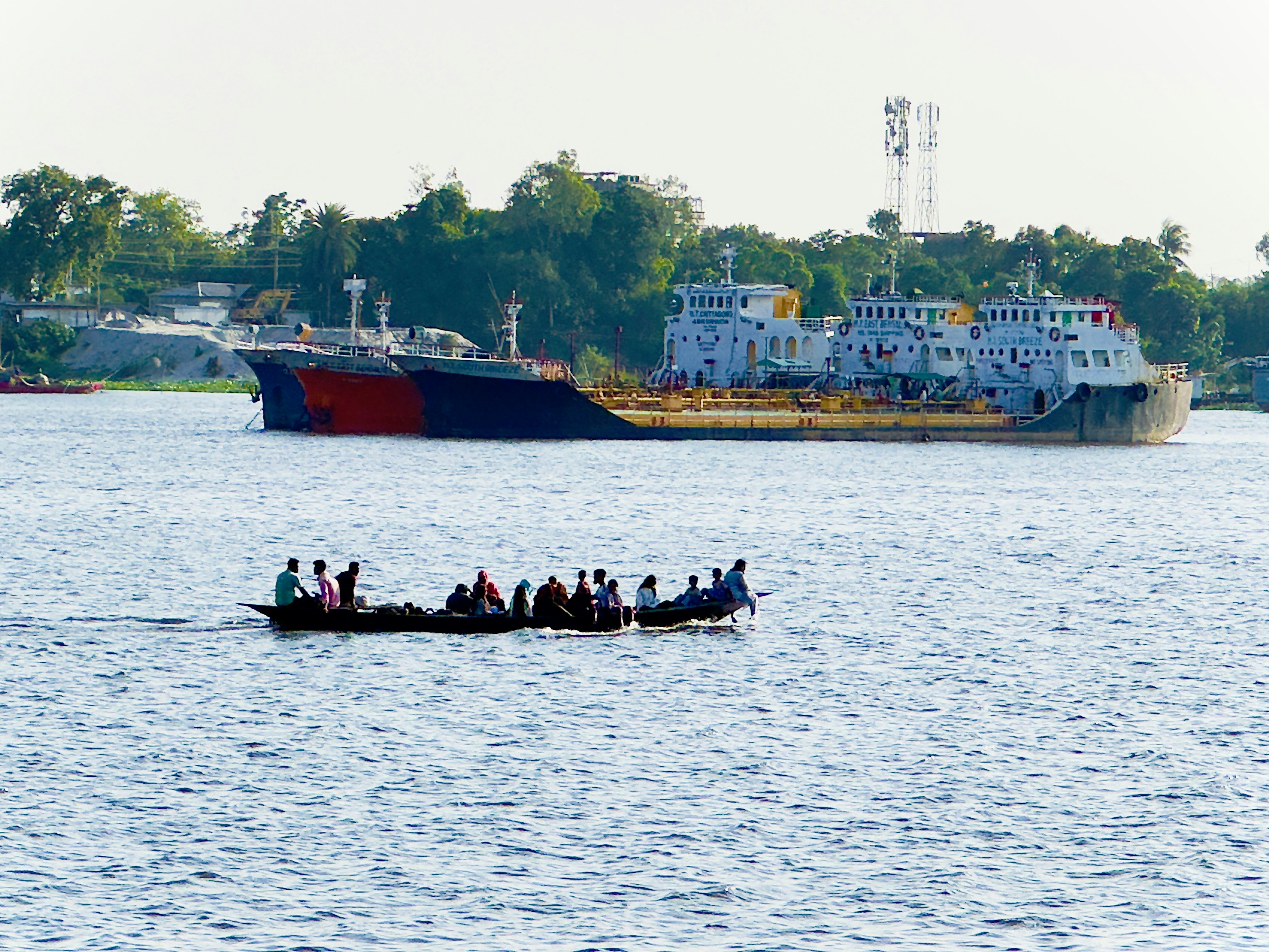 Tug and Traveller: A River Crossing