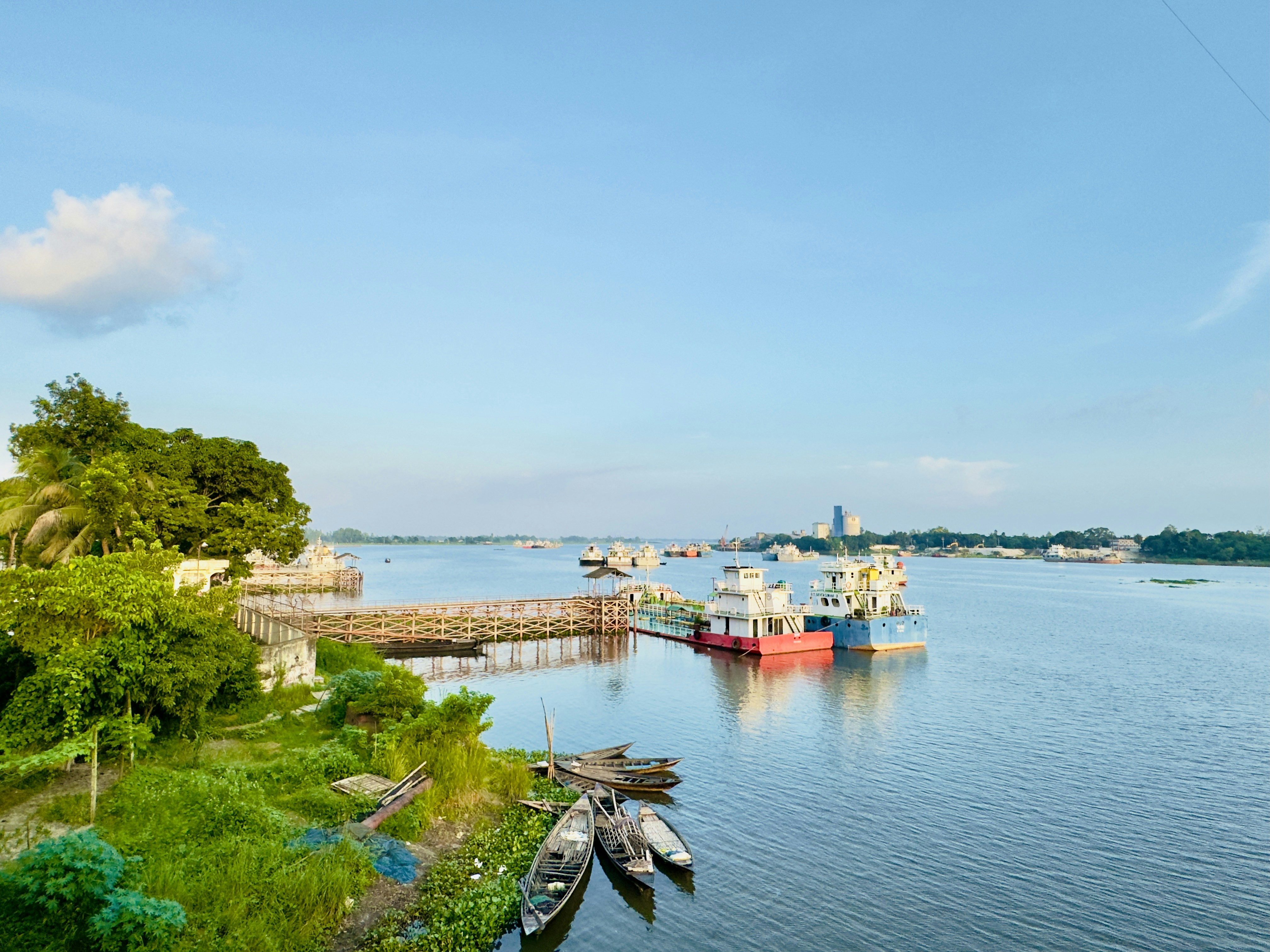 Harbor at Golden Hour: Boats, Docks, and Sky