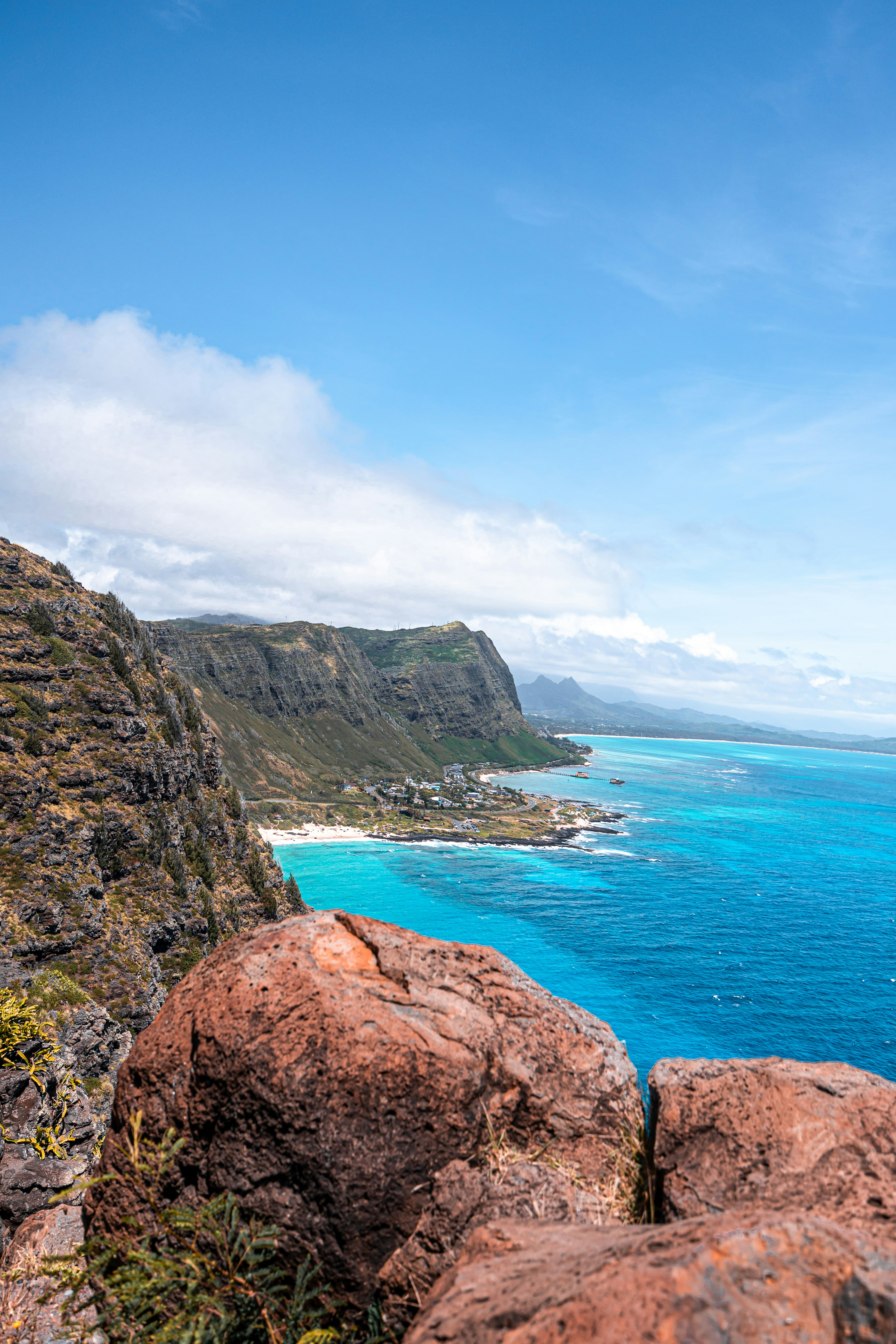 Crimson Boulders Overlooking Turquoise Atlantic Edge
