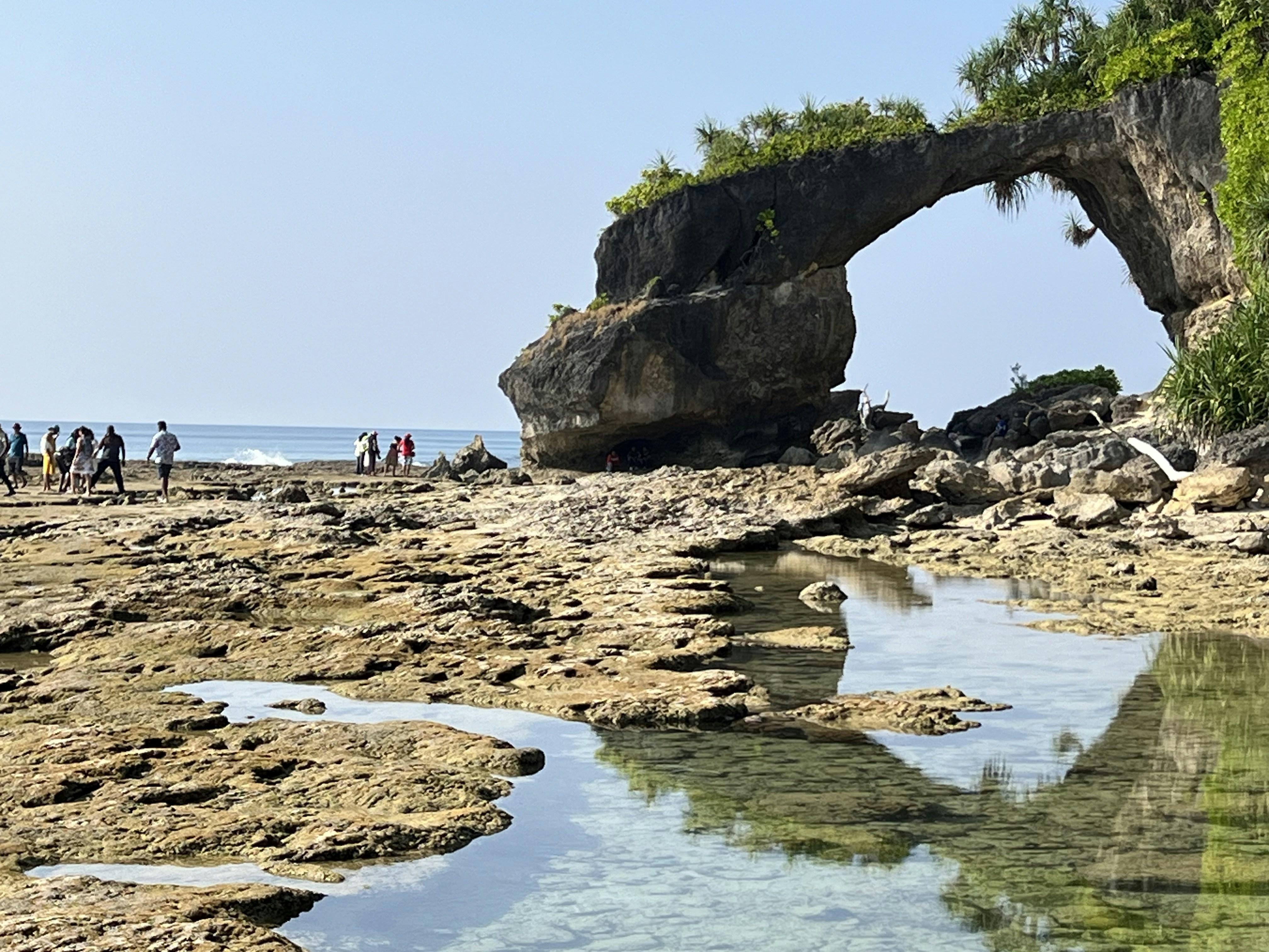 Natural Arch at Shoreline: A Quiet Meeting of Sea, Stone, and Sky