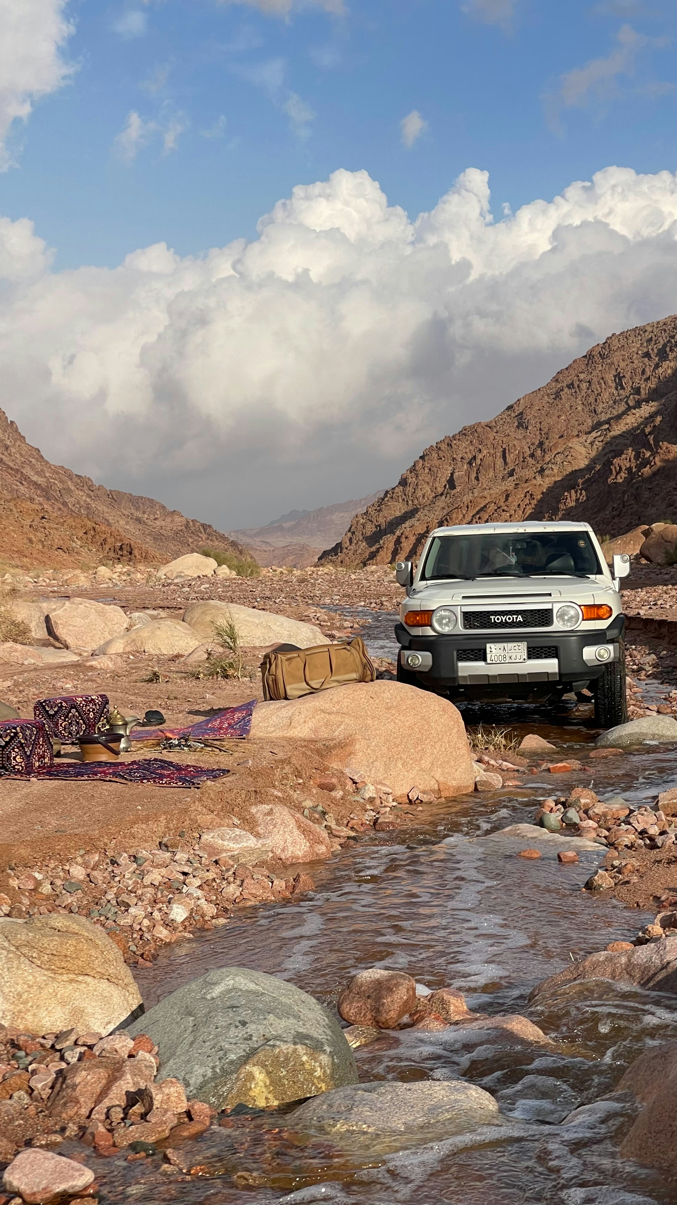 Desert Riverside Camp: Toyota on the Rugged Riverbed