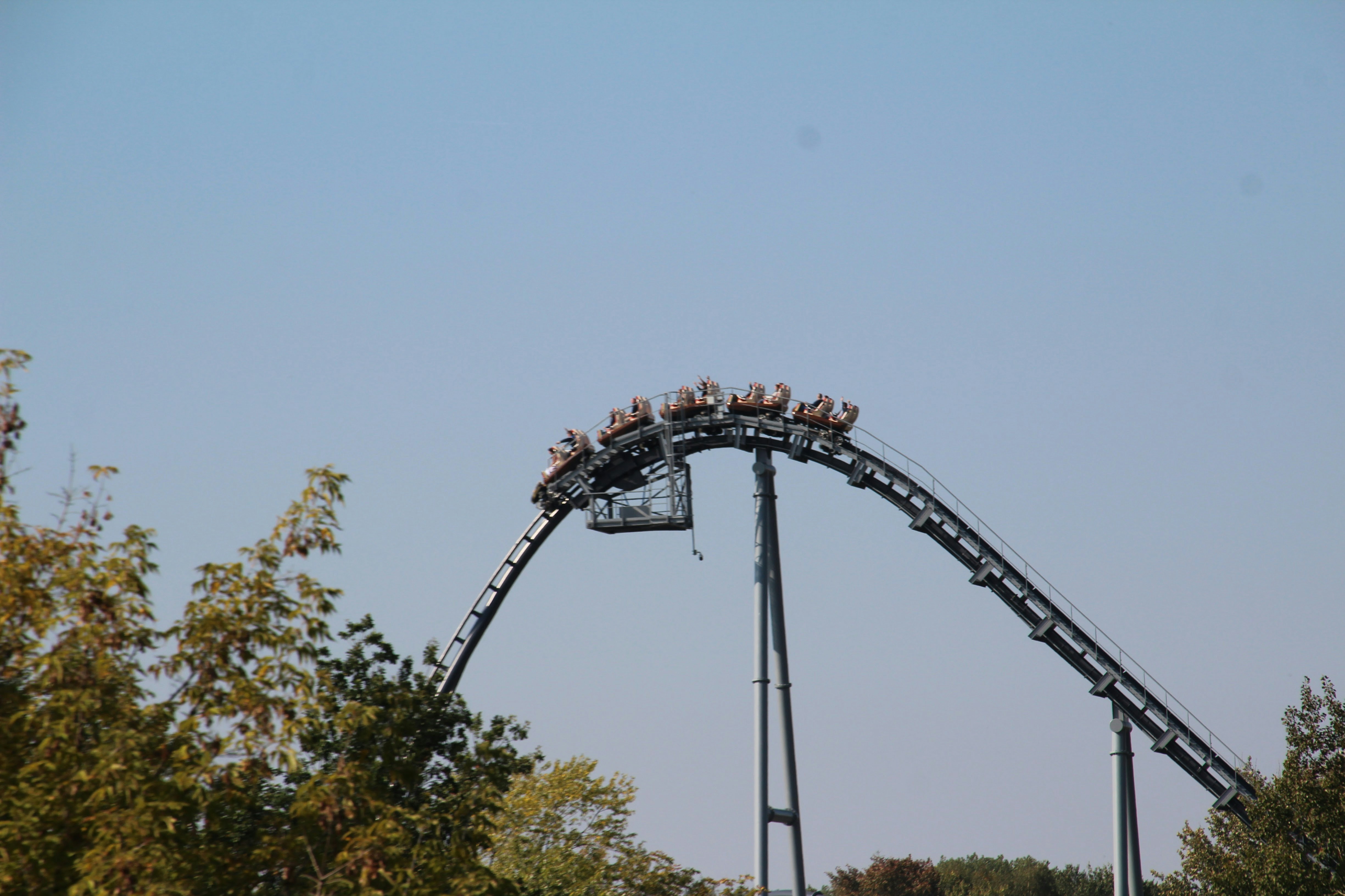 Arc of Steel: A Roller Coaster Crest Frames the Sky