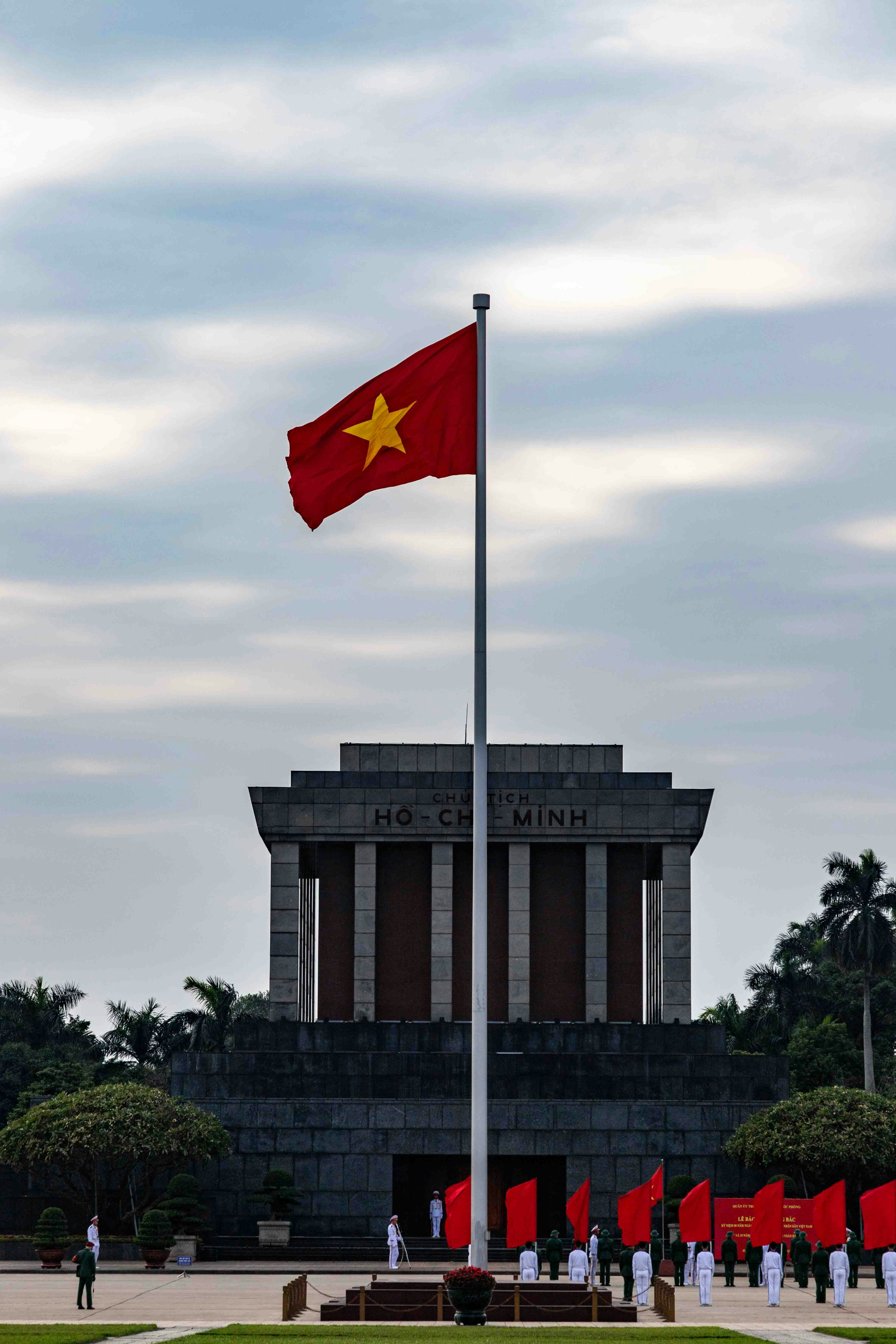 Flag over Ho Chi Minh Mausoleum: symmetry, ceremony, and stone