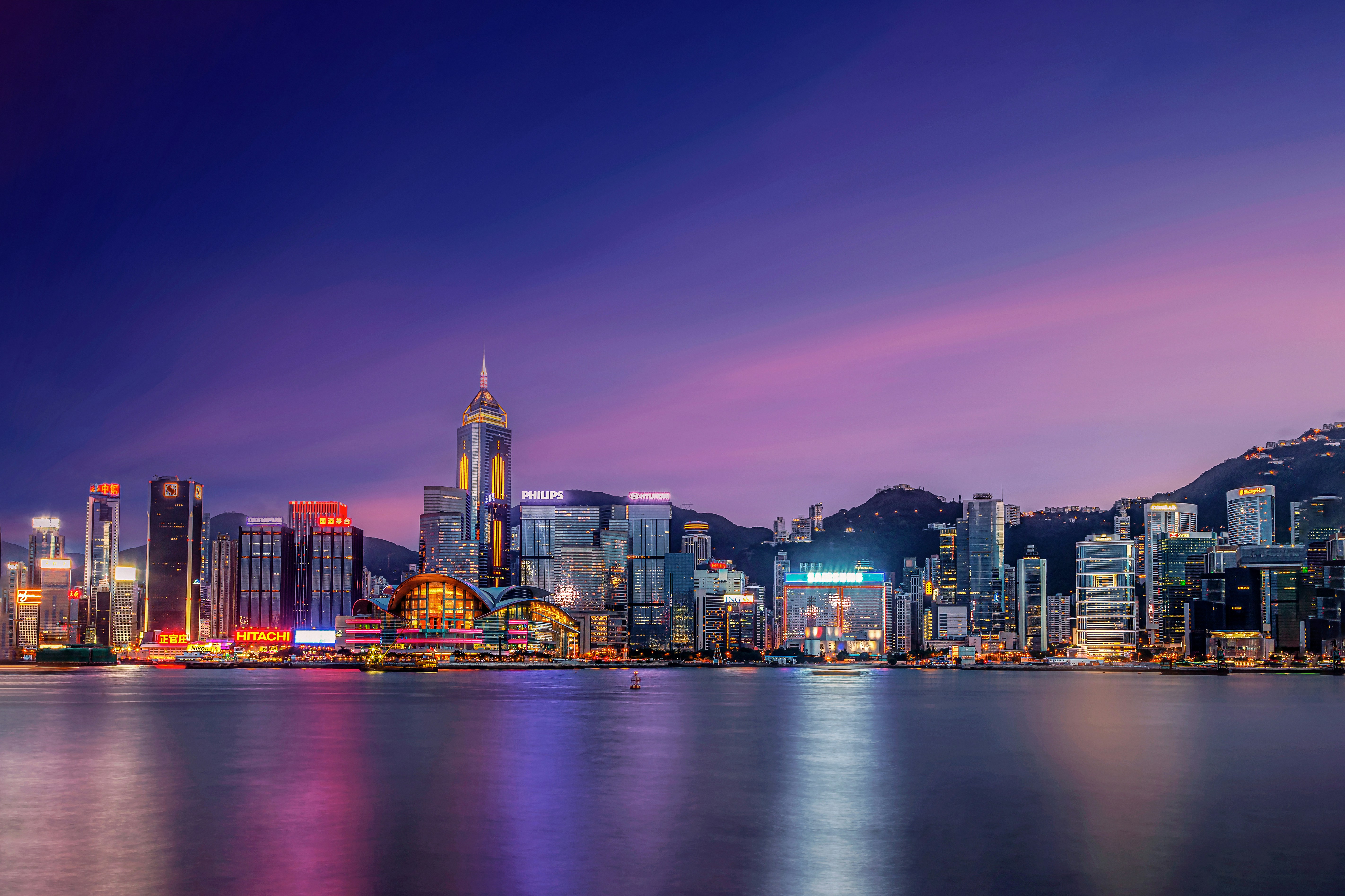 Neon Horizon: Nightscape of a Harbor Skyline