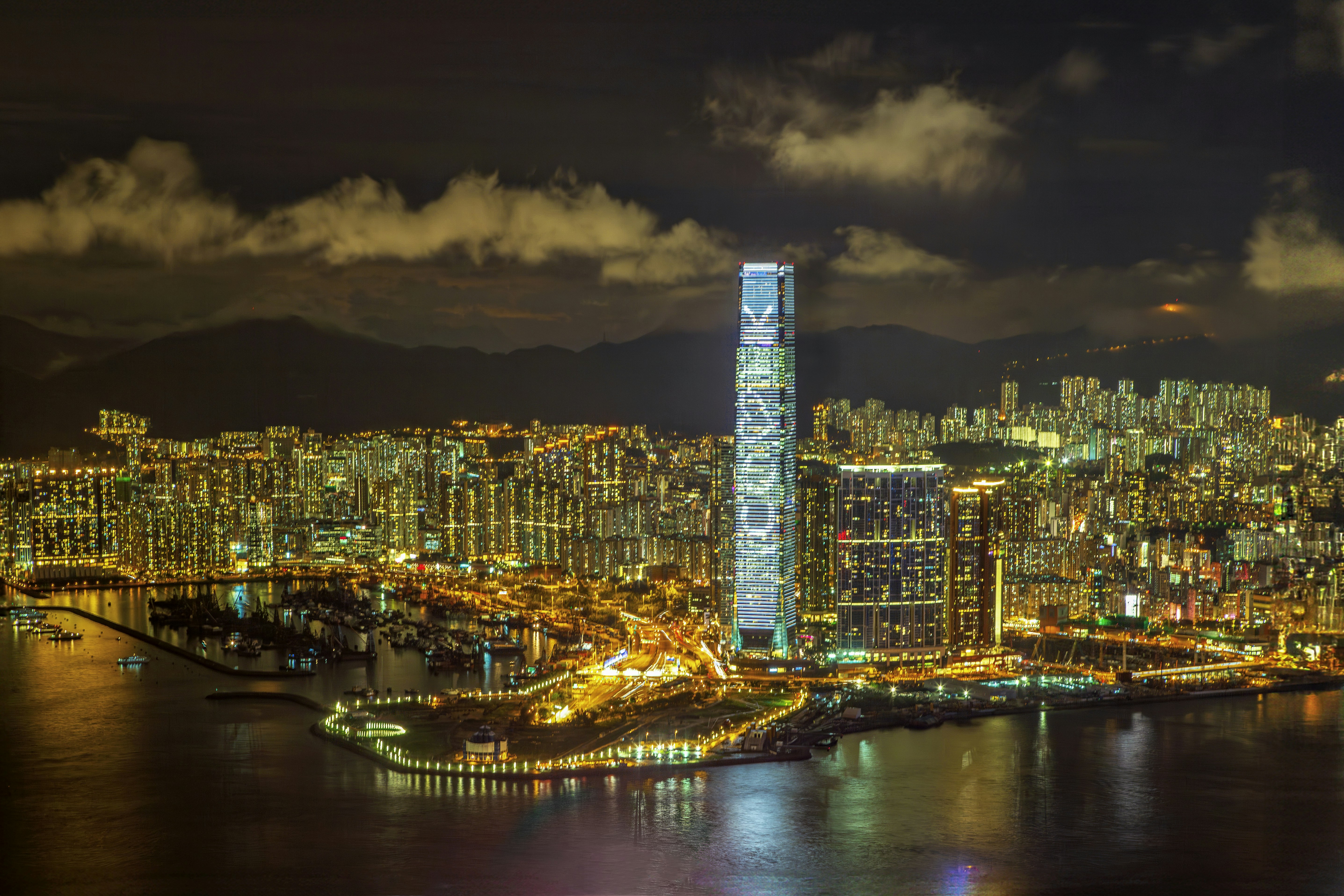 Neon Spine: Cityscape by the Waterfront
