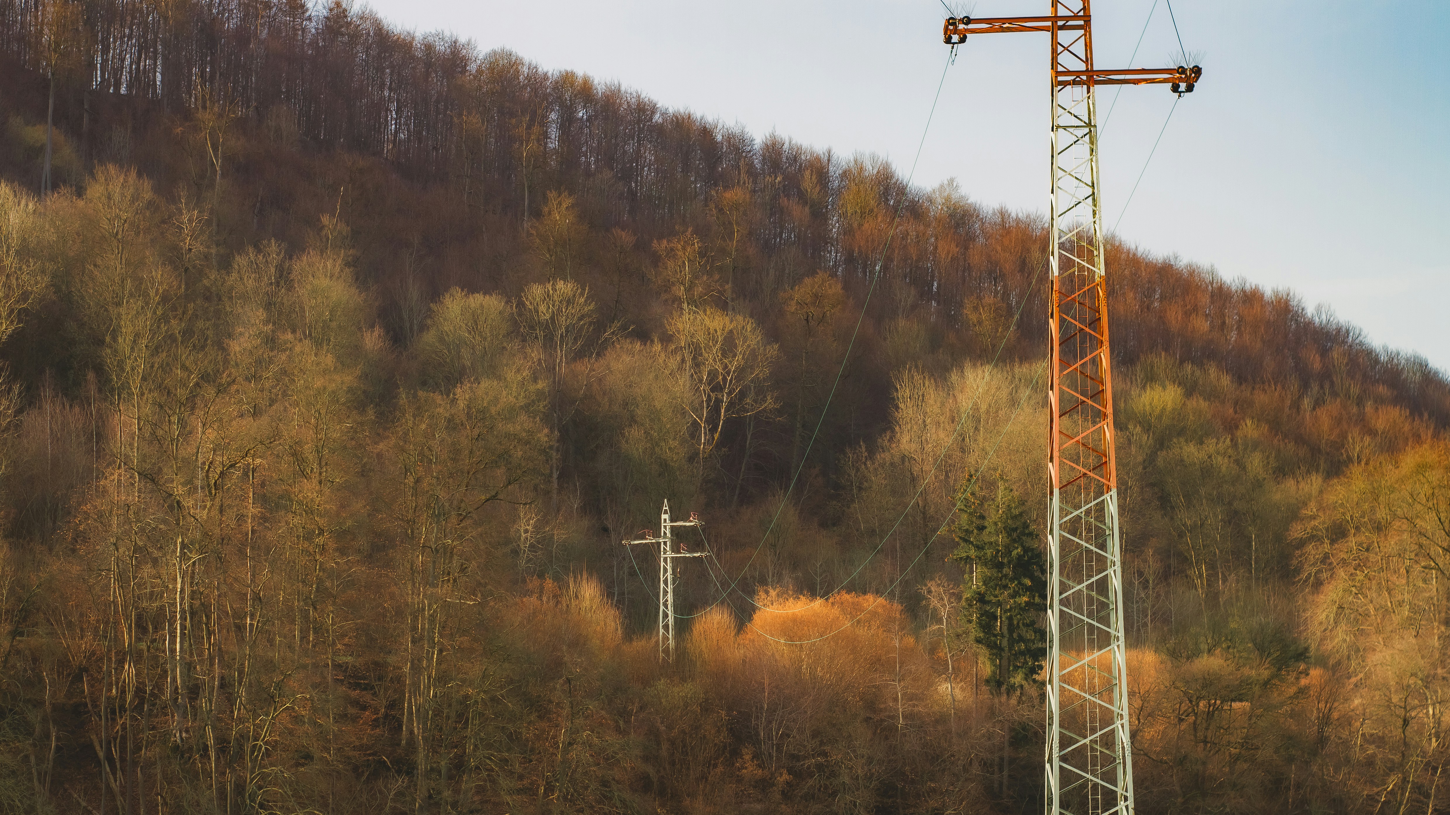 Industrial Crane Over The Autumn Ridge