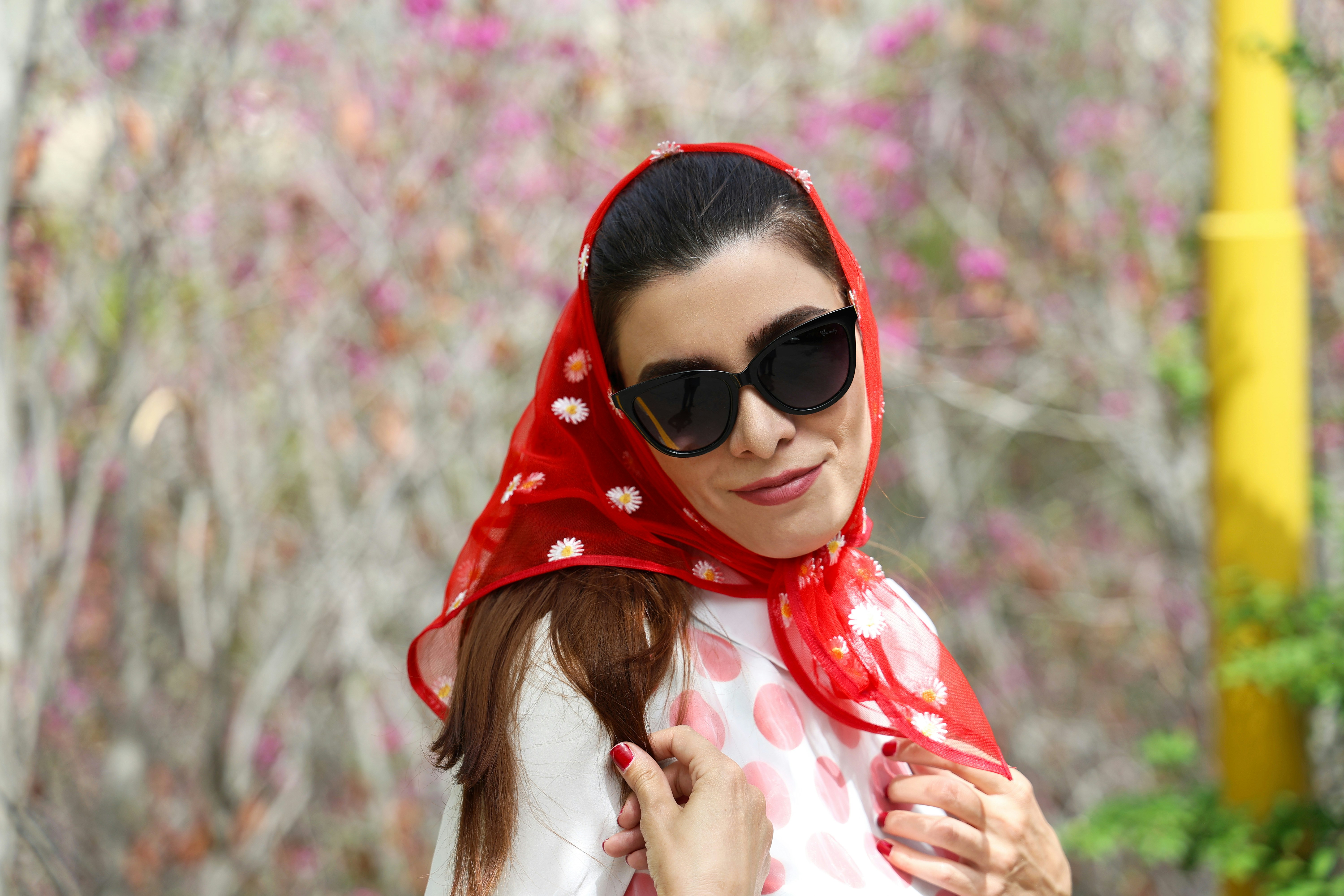 Red Veil, Quiet Gaze: A Portrait in Springtime Light