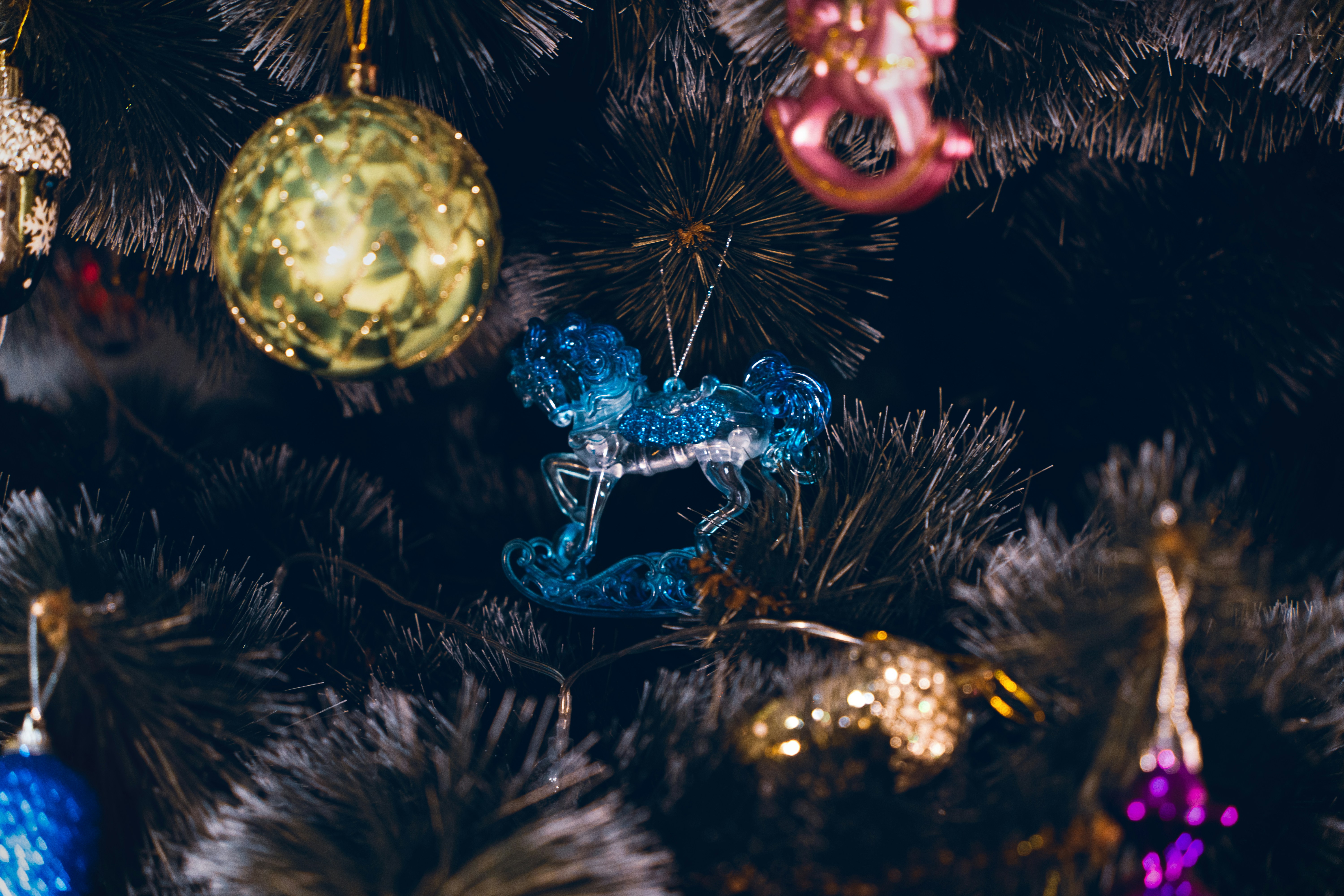 Blue Carousel Ornament on a Cozy Christmas Tree