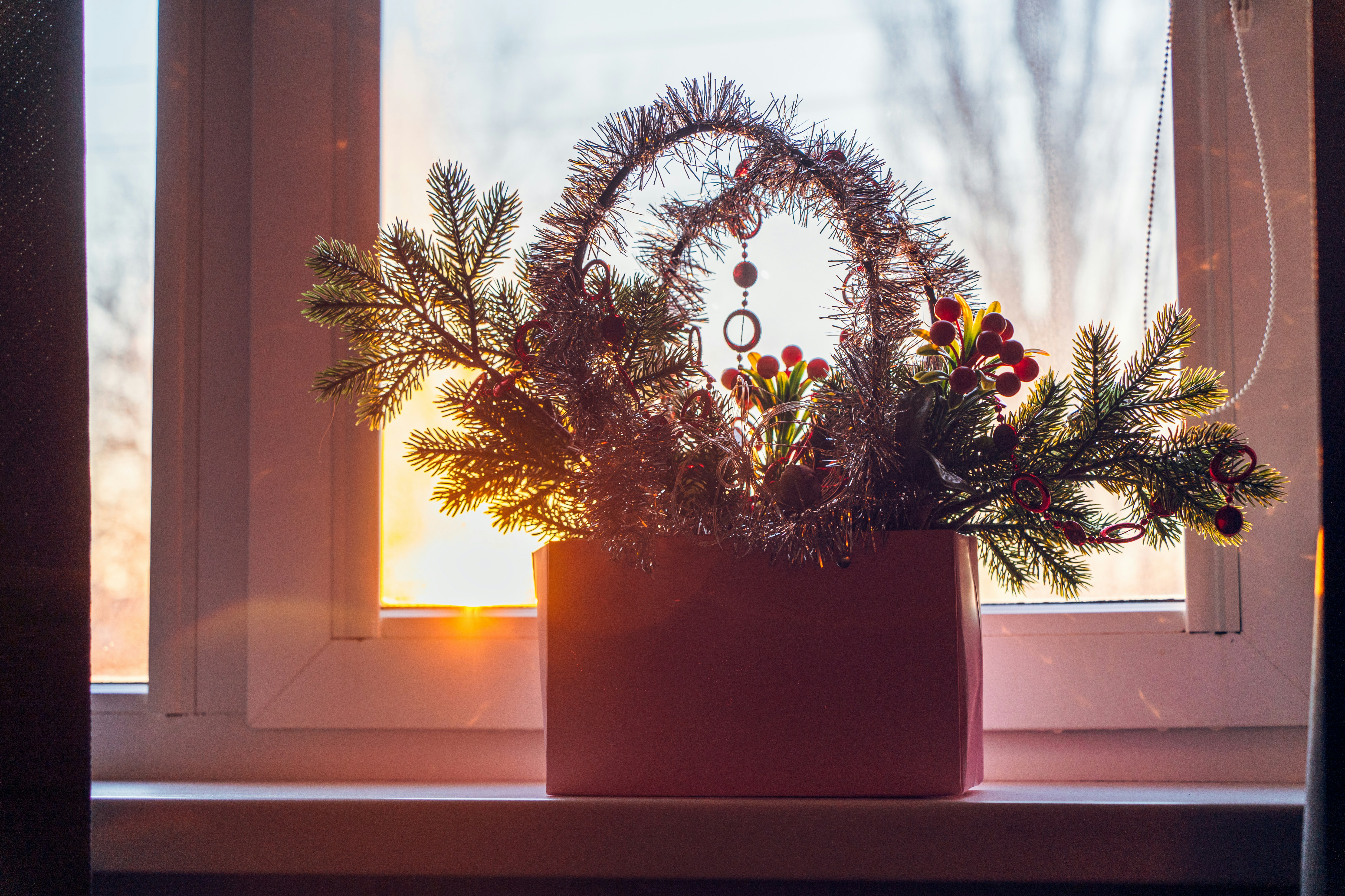 Sunlit Wreath: Quiet Holiday Light Through a Window