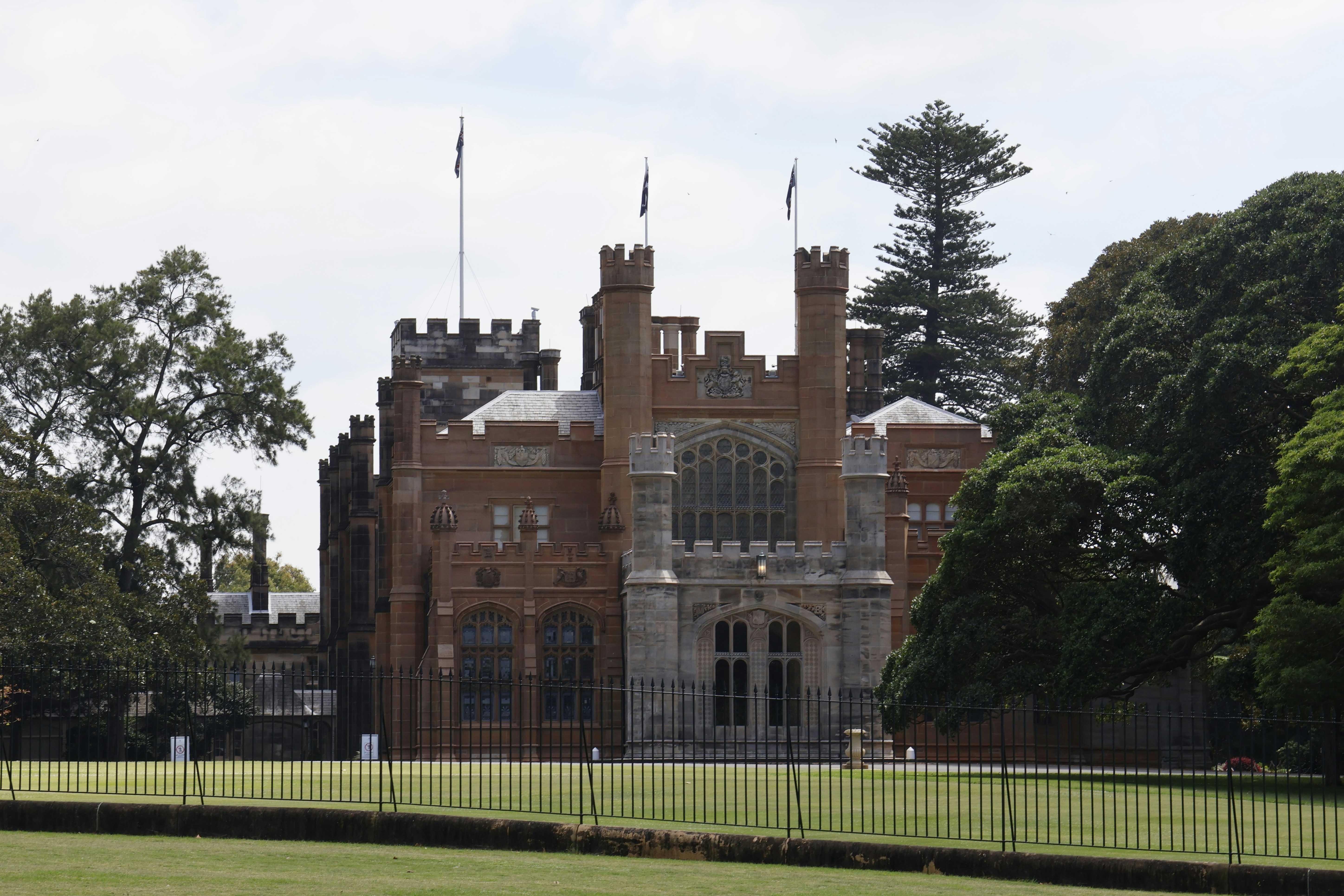 Red Brick Manor Rising: A Historic Gatehouse in the Park
