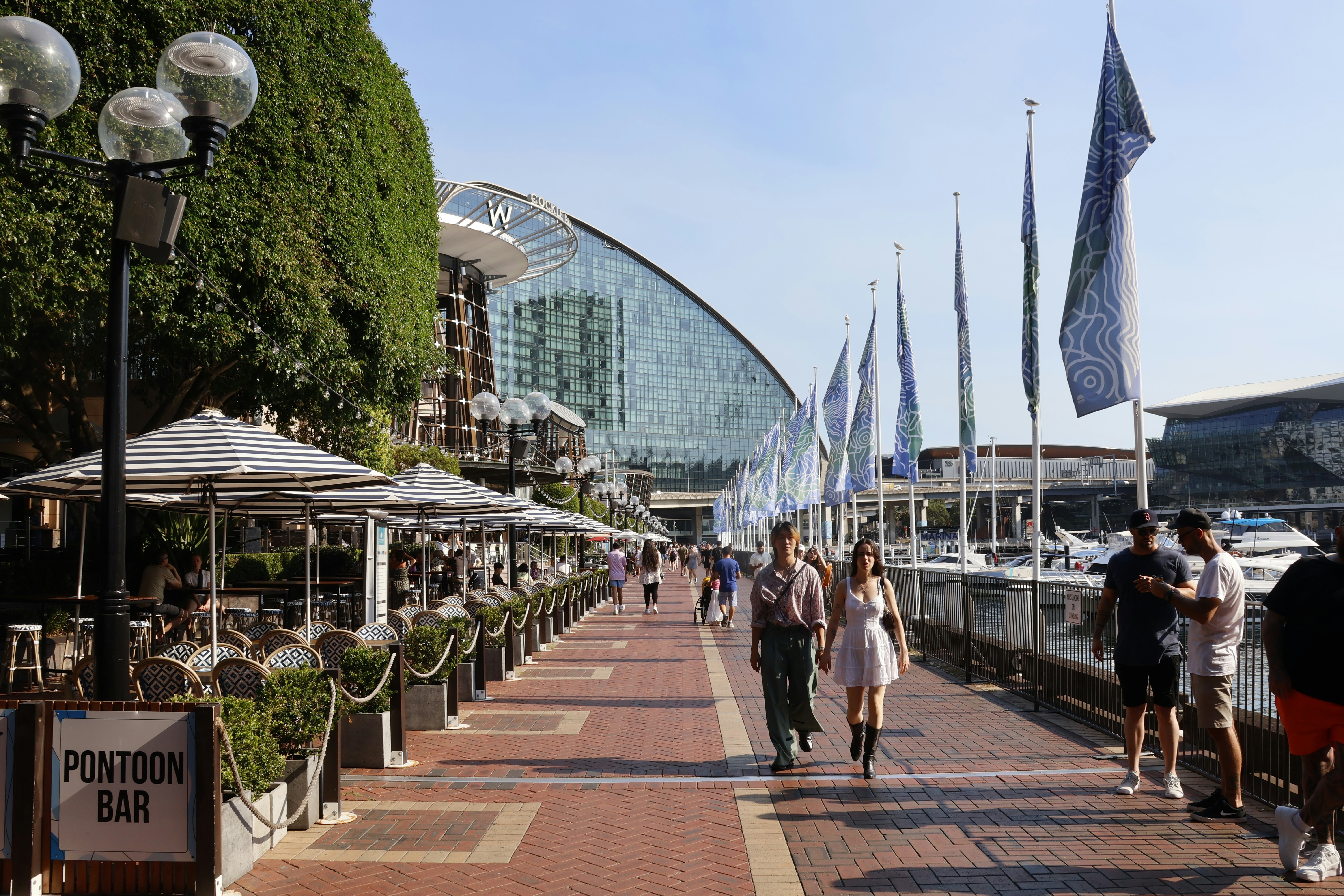 Sunlit Promenade Beyond the Glass Pavilion