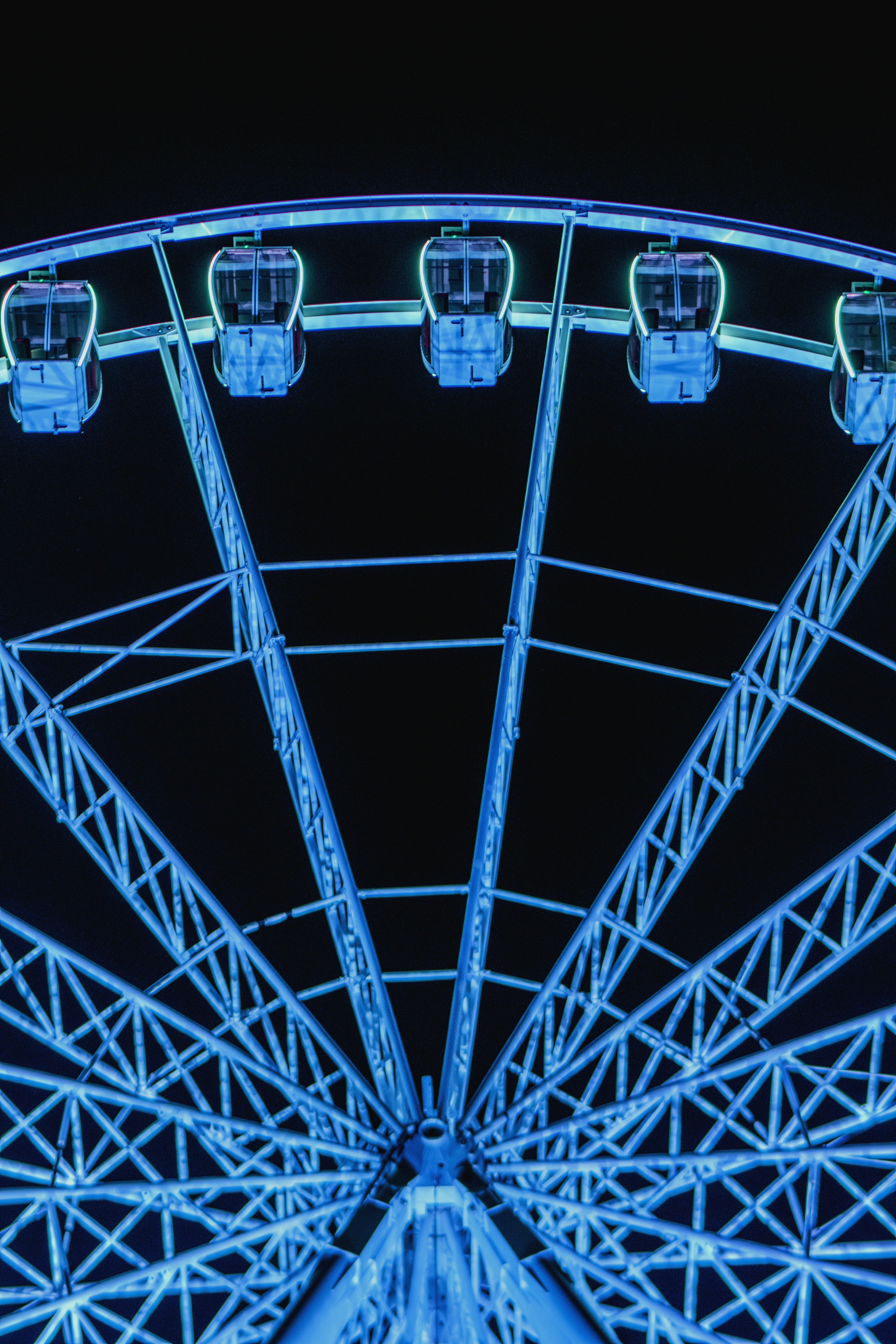 Neon Ferris Wheel Radiance: A Geometric Night Portrait