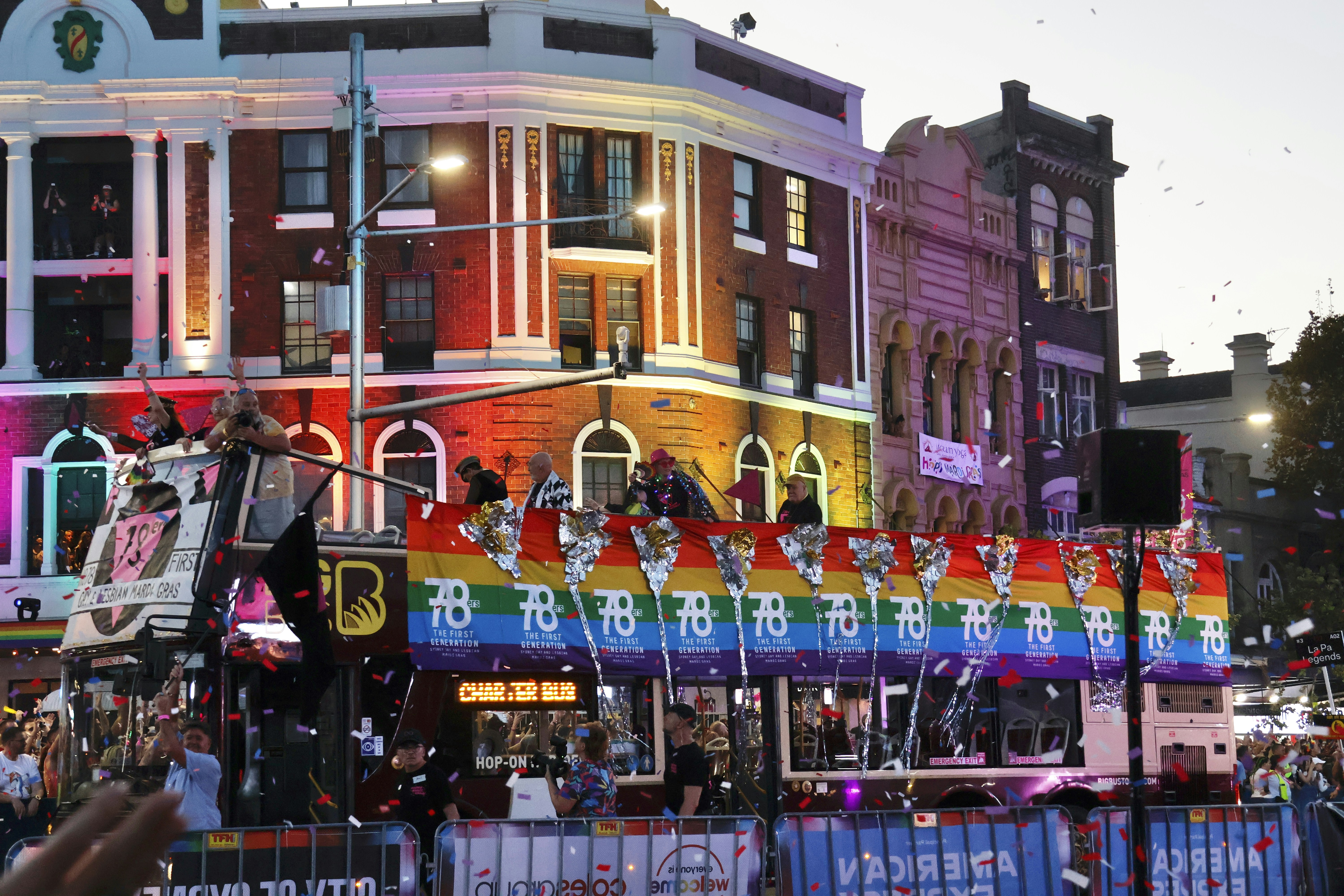 Neon Facade Parade: A Multicolored City Bloc in Motion