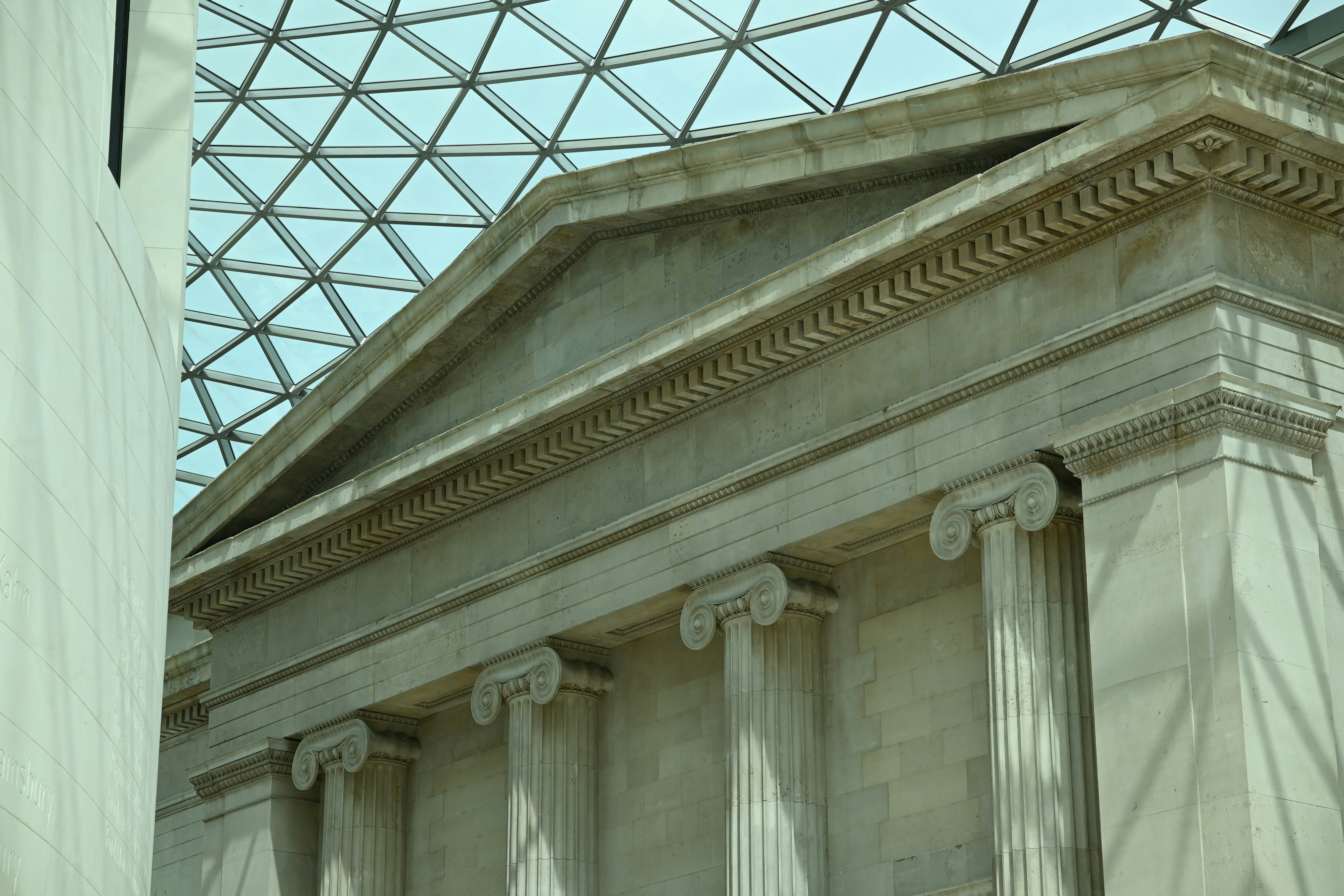 Classical Frieze Under Glass Sky