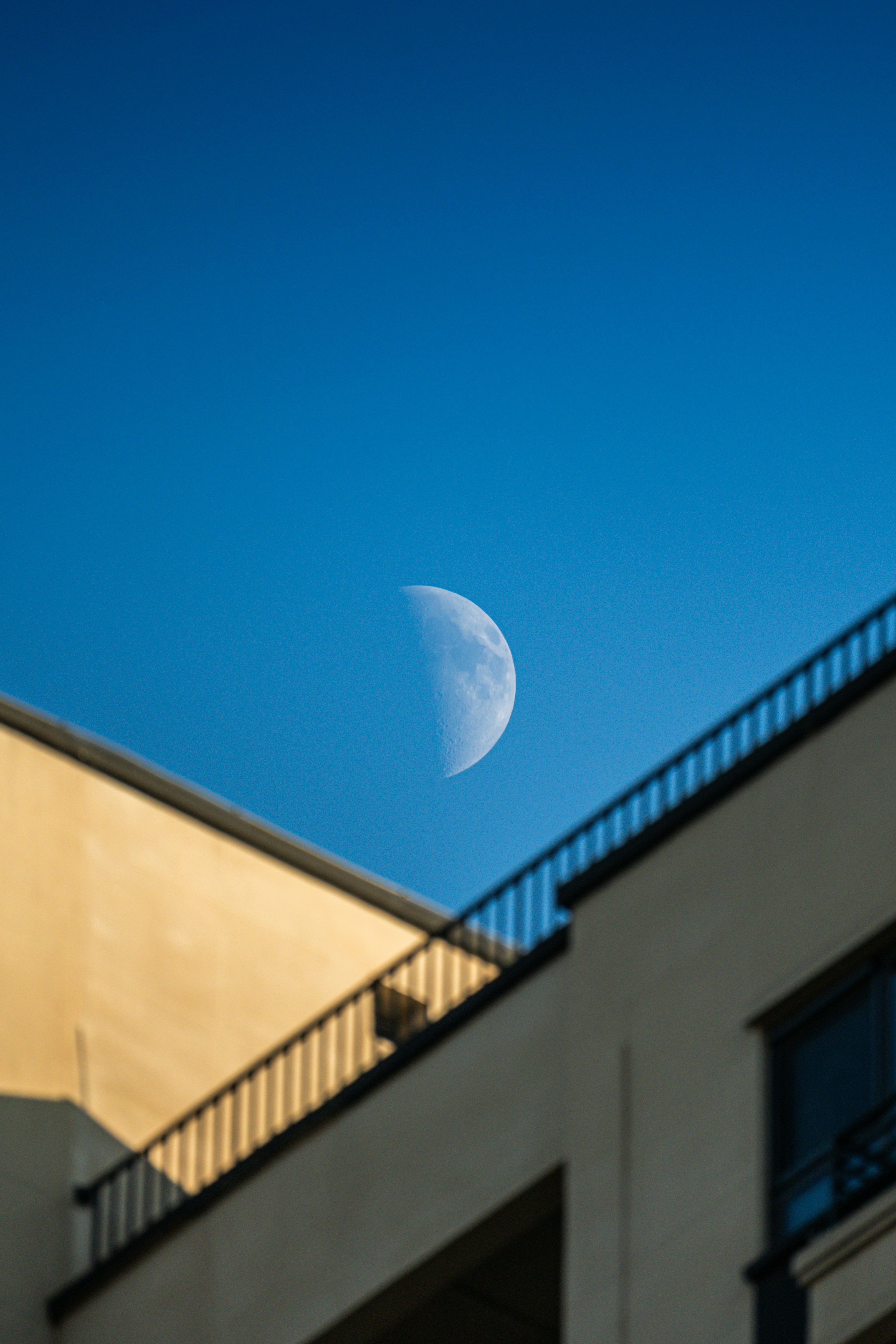 Crescent Moon over a Quiet Urban Terrace