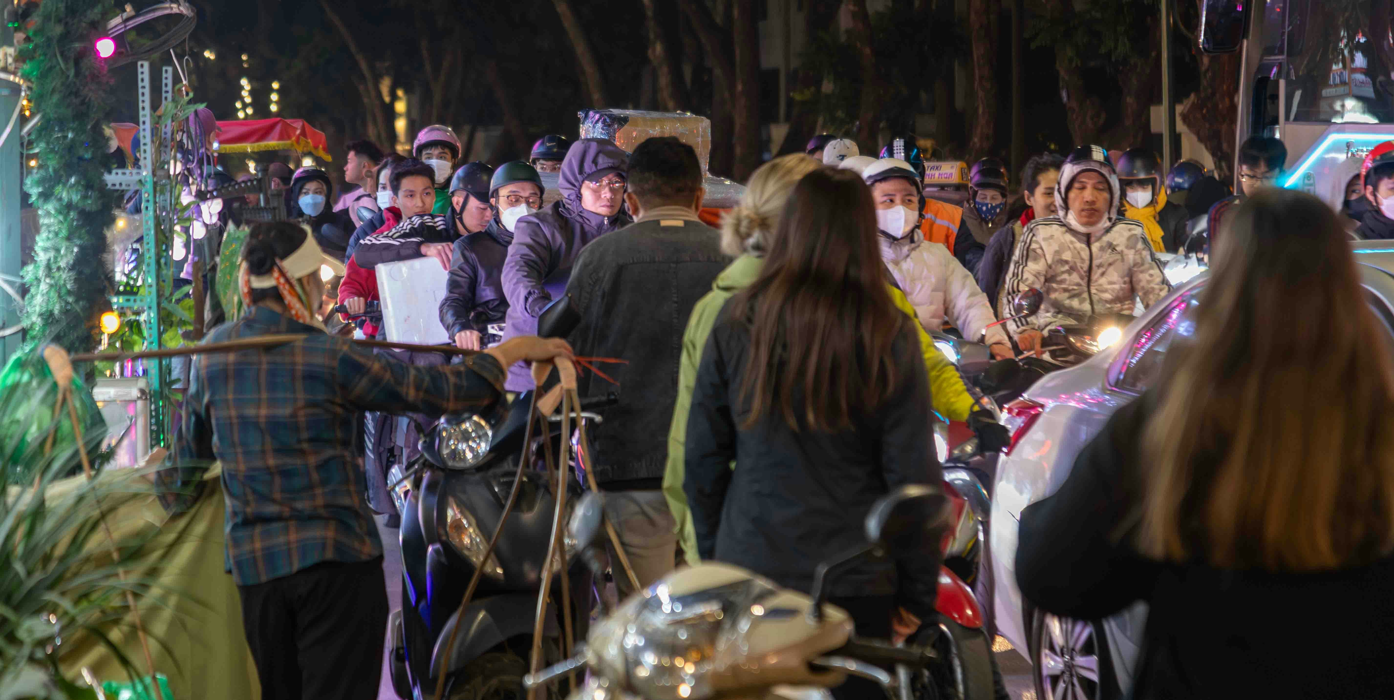 Night Market Pulse: Faces, Trees, and Neon Lights